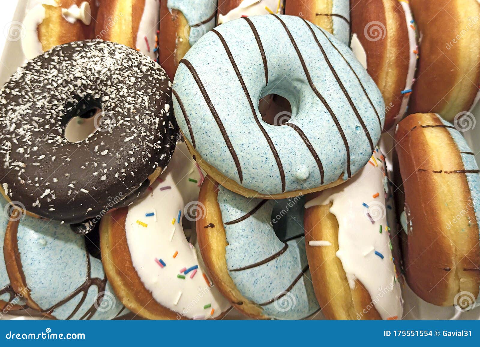 Assorted Donuts with Chocolate Icing, Blue Icing and Sprinkle Donuts ...