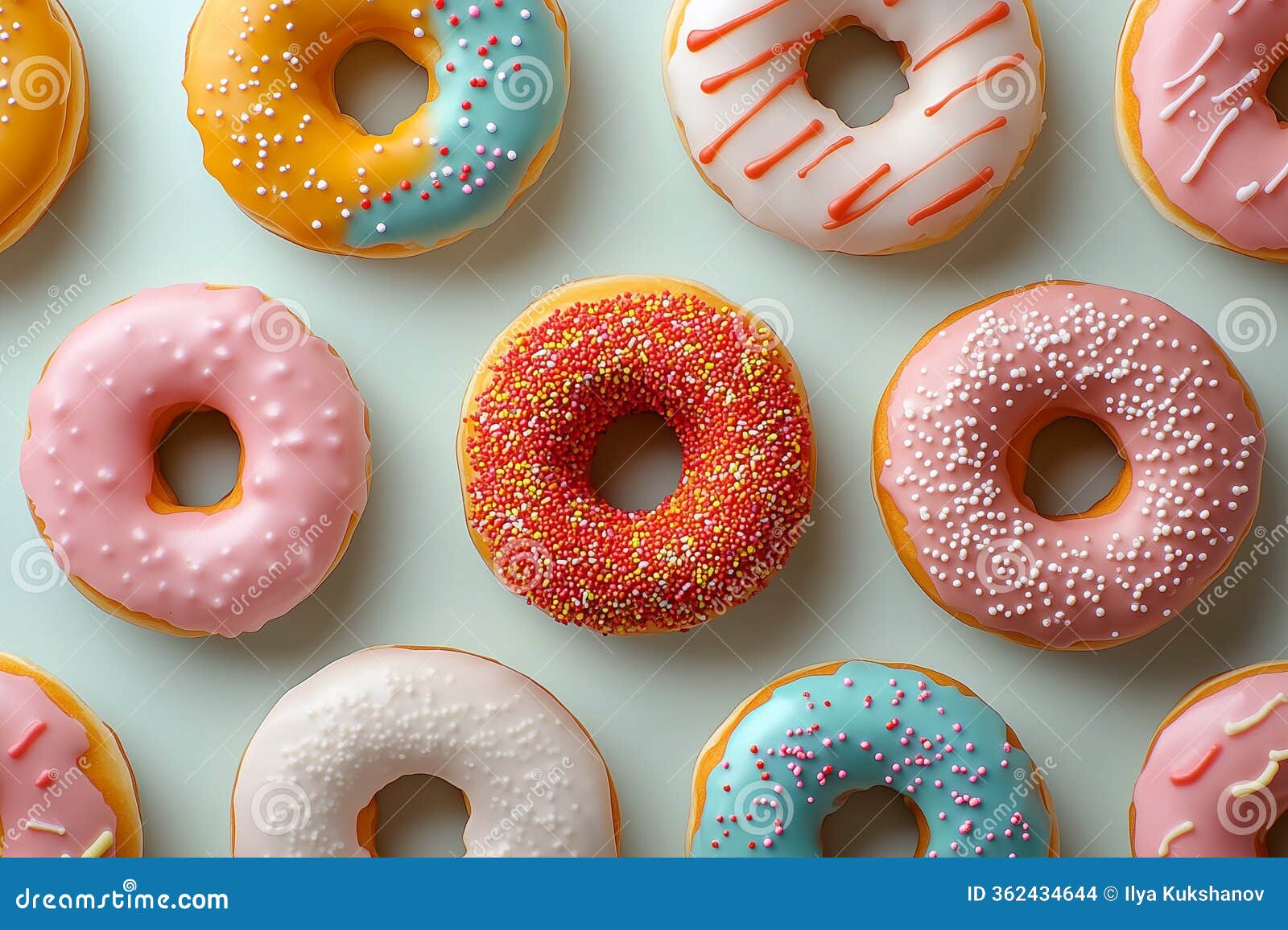 Vibrant Donuts with Sprinkles in Pastel Colors Against Light Blue ...