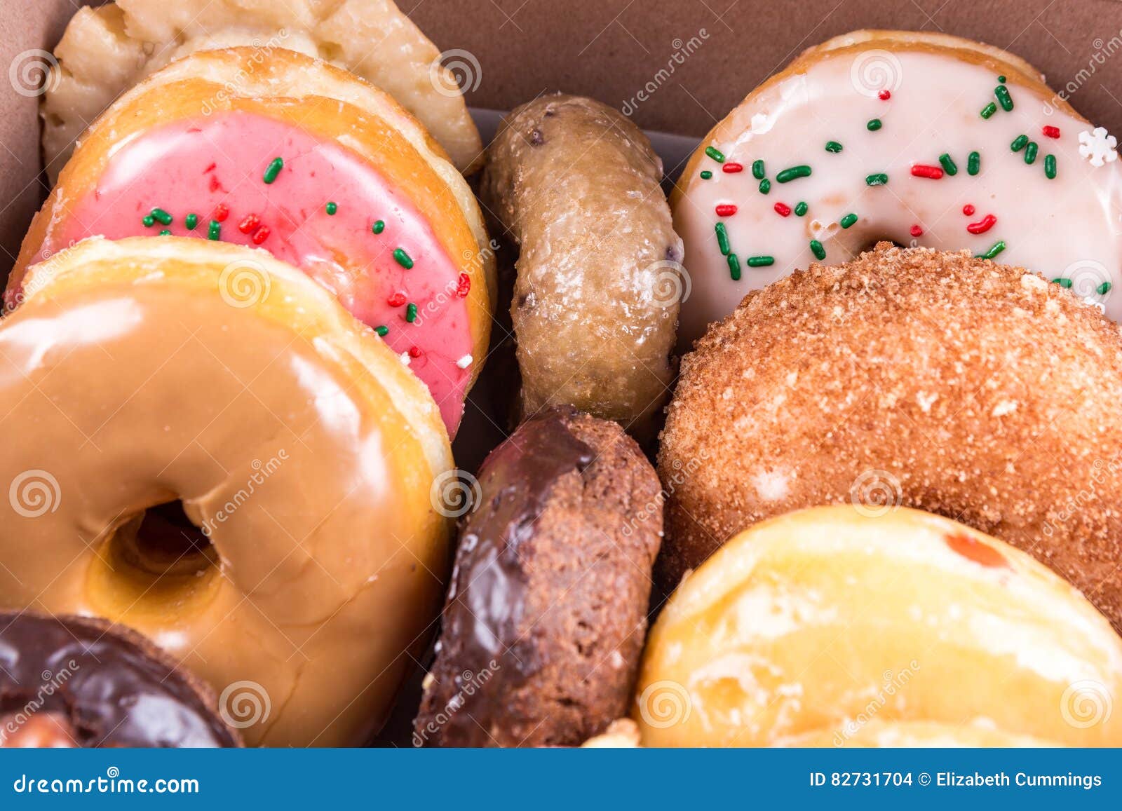 An Assorted Dozen Donuts in a Box Stock Photo - Image of sweet ...