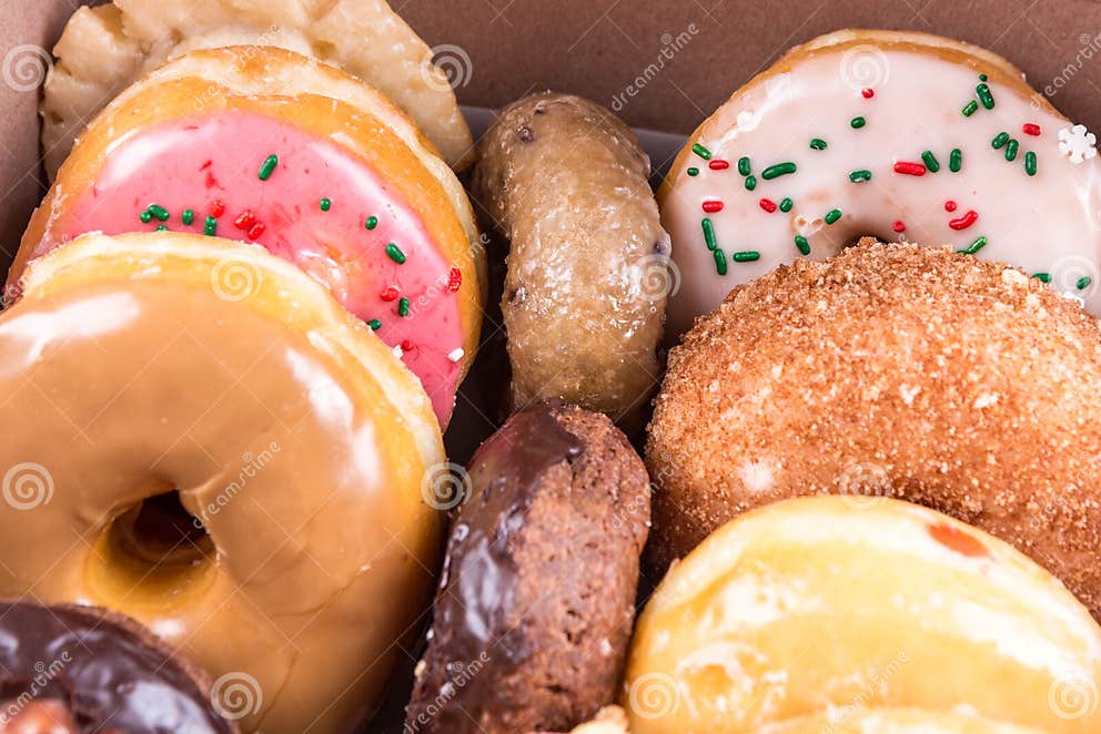 An Assorted Dozen Donuts in a Box Stock Photo - Image of sweet ...
