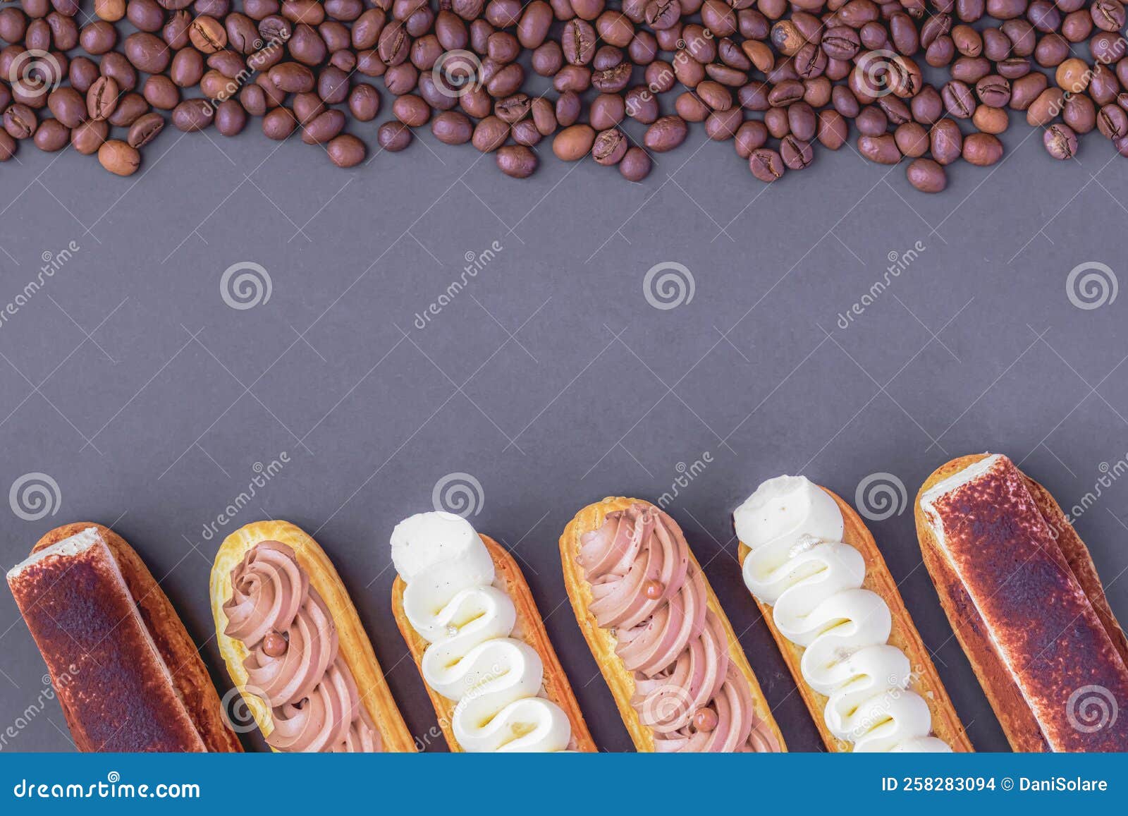 Assorted Eclairs Covered with Different Types of Creams Stock Photo ...