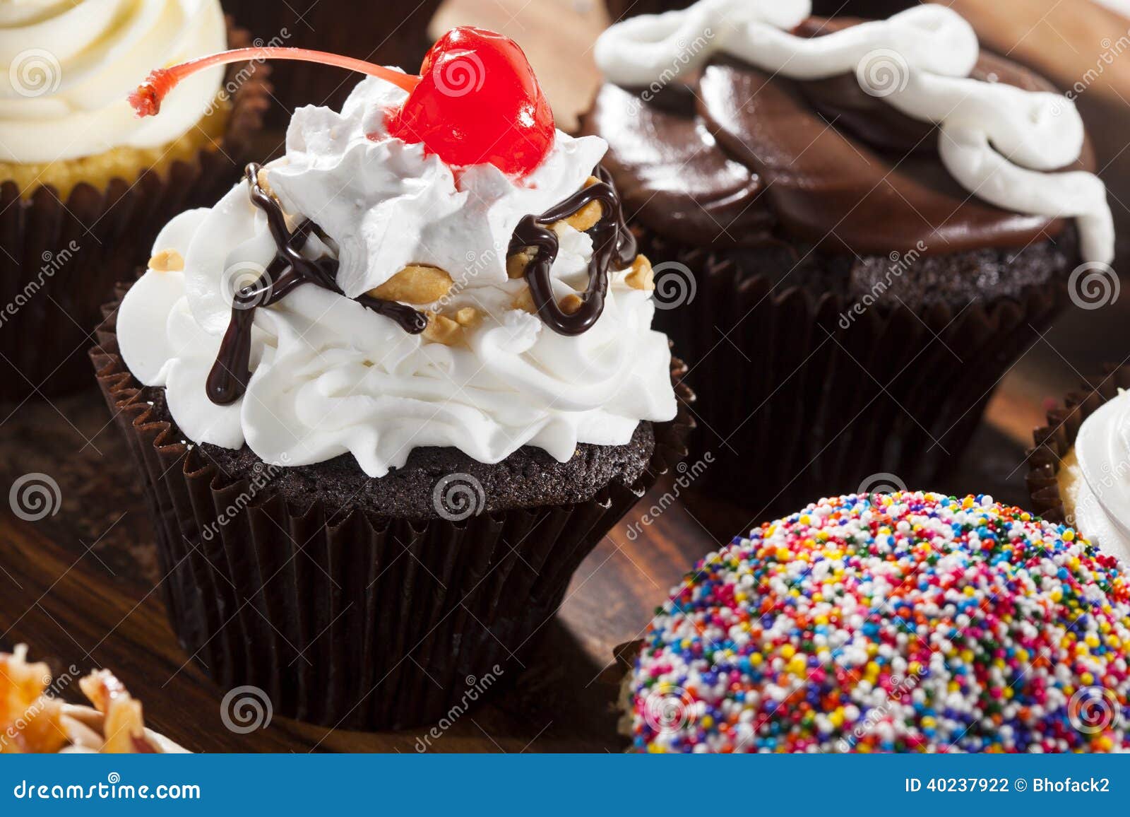 Assorted Fancy Gourmet Cupcakes with Frosting Stock Photo - Image of ...