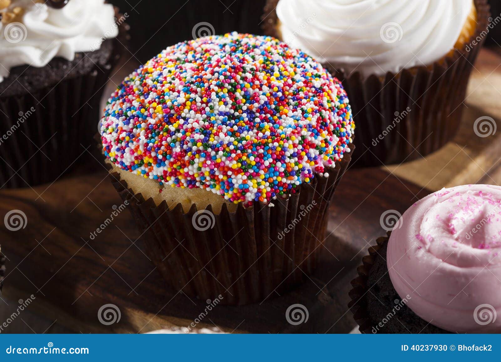Assorted Fancy Gourmet Cupcakes with Frosting Stock Photo - Image of ...