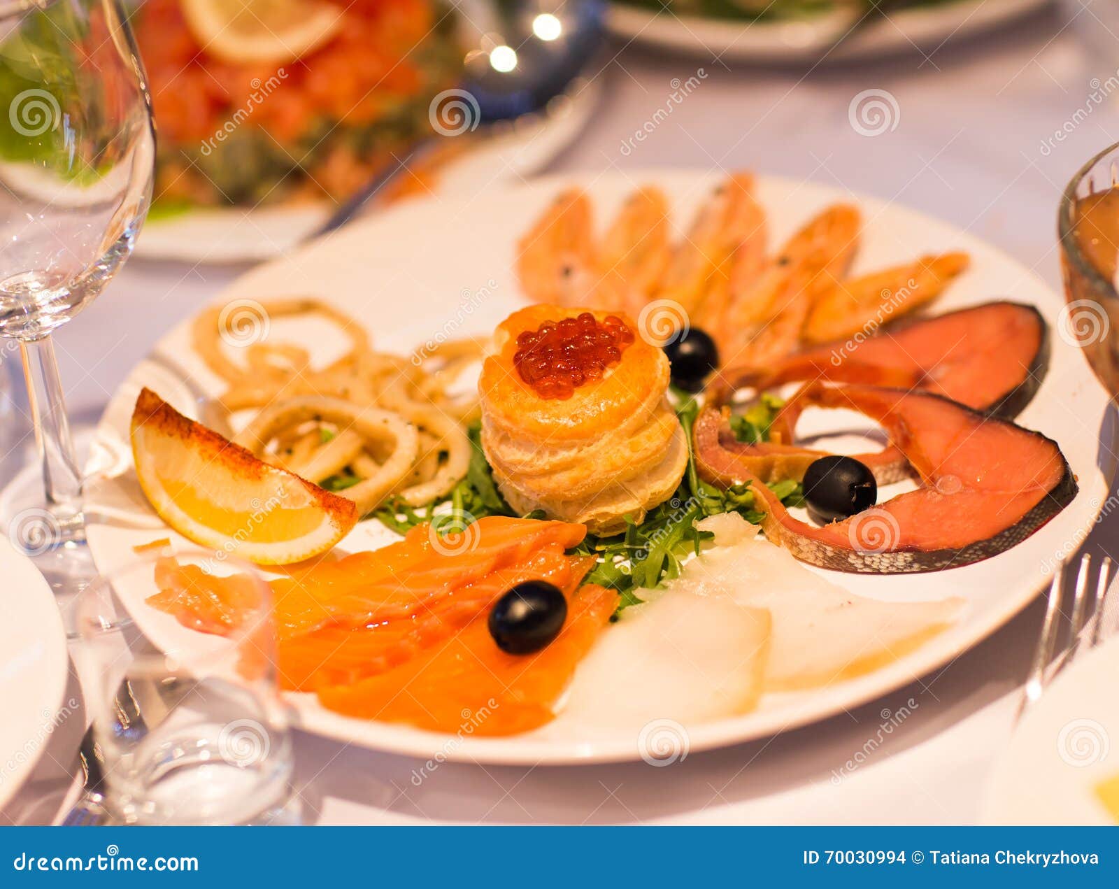 Assorted fish on a plate stock photo. Image of cook, banquet - 70030994