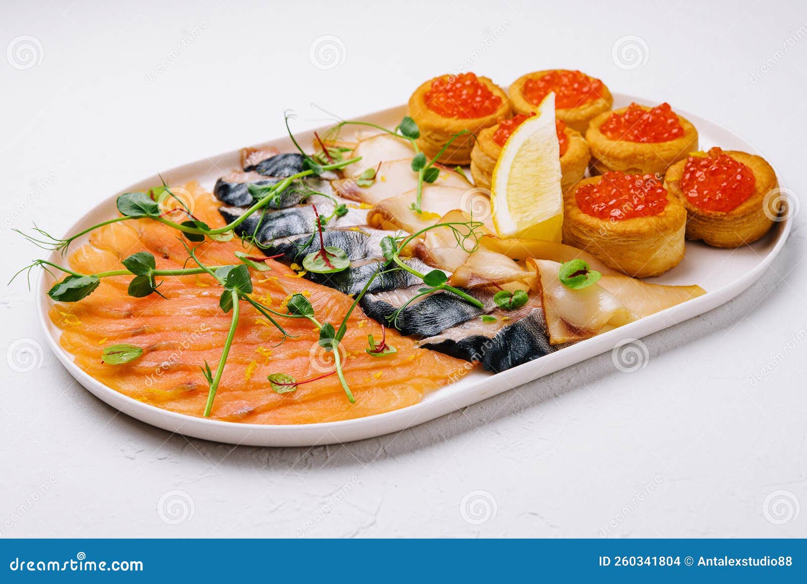 Assorted Fish on a Plate. Smoked and Salted Fish Stock Photo - Image of ...