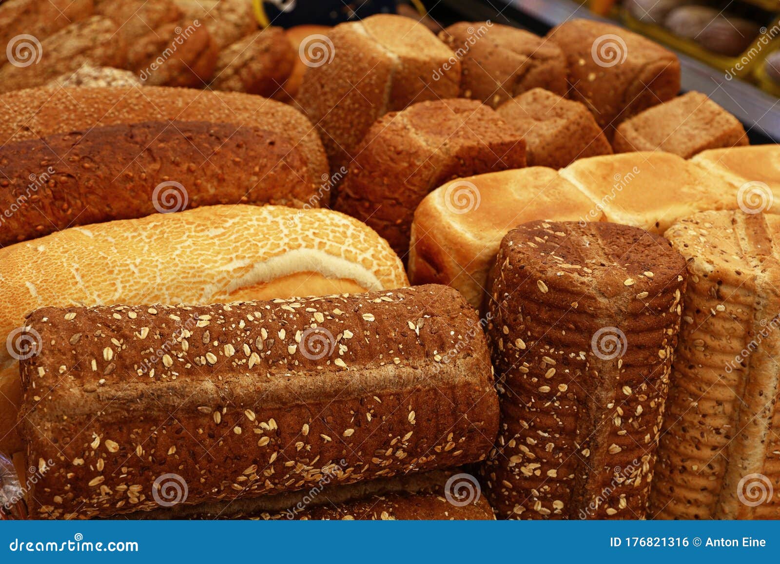 Assorted Fresh Bread Loaves on Retail Display Stock Photo - Image of ...