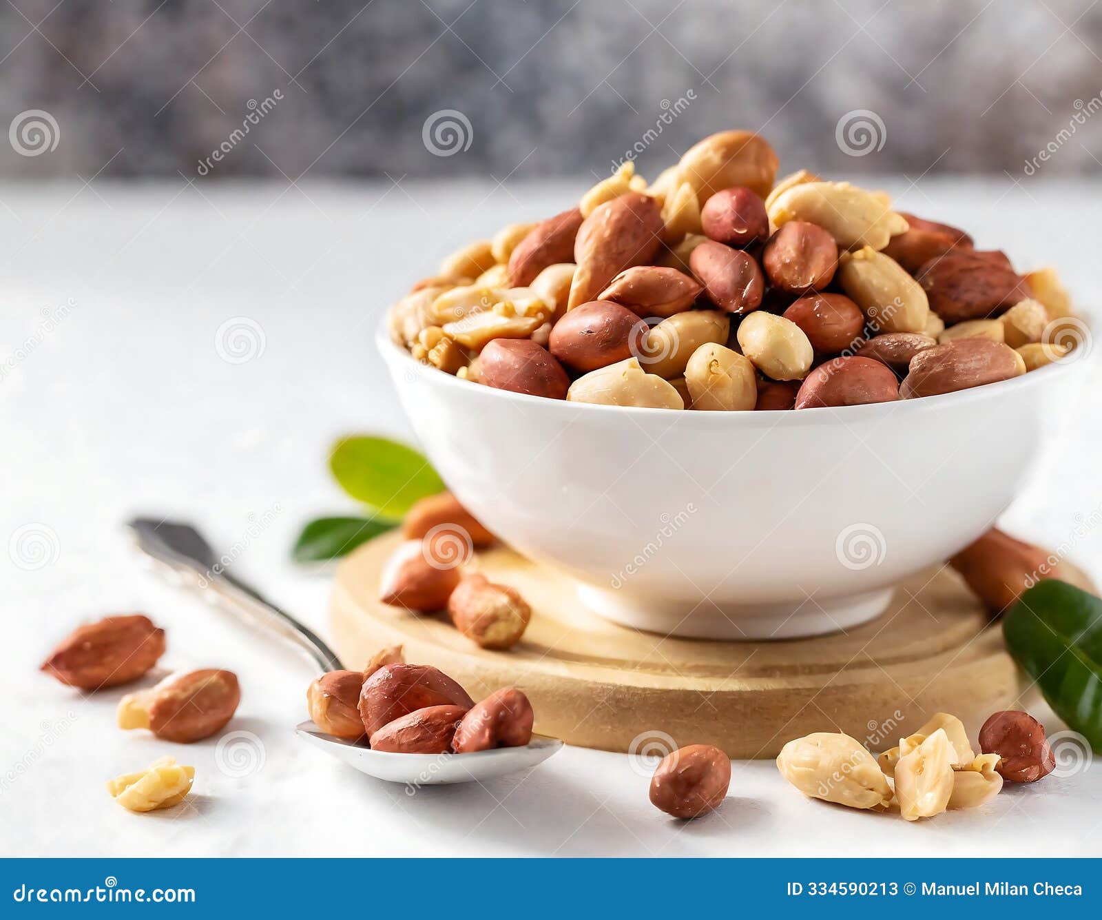 Assorted Fresh Peanuts in a White Bowl on a Textured Surface Stock ...