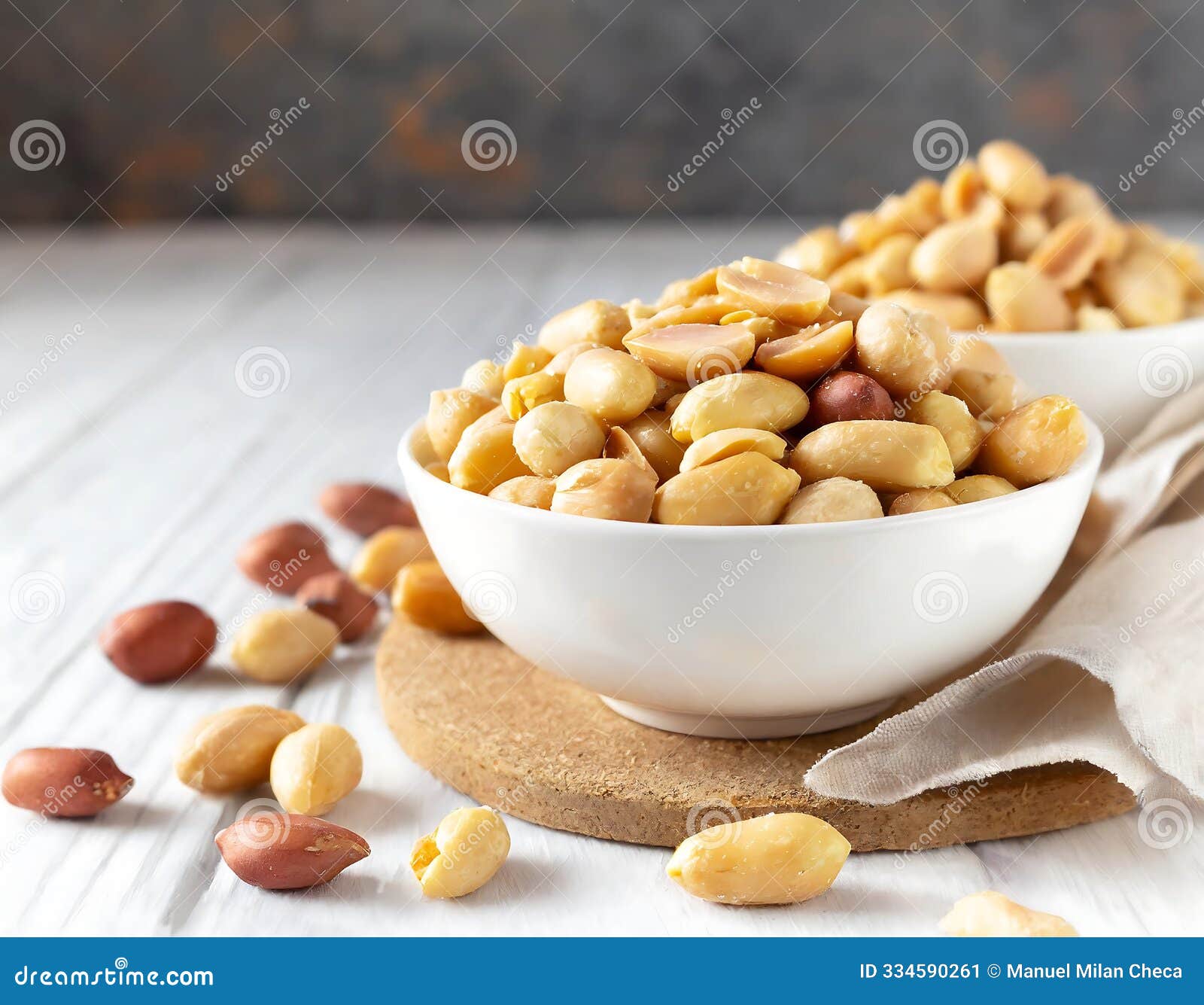 Assorted Fresh Peanuts in a White Bowl on a Textured Surface Stock ...