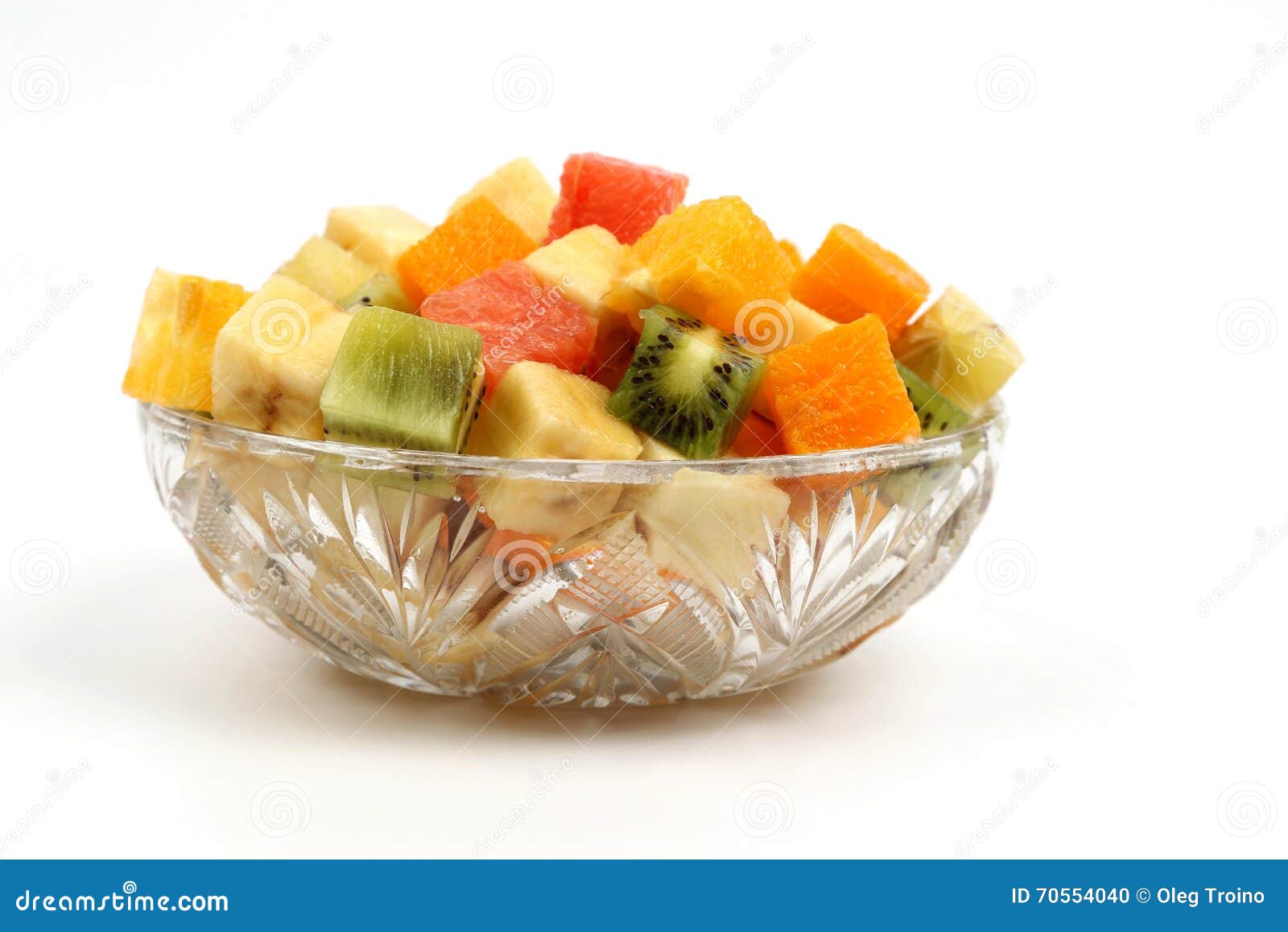 Assorted Fruit Chopped in Cubes on a Plate on White Background Stock ...