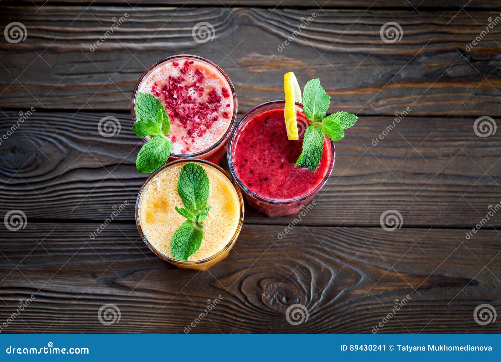Assorted Fruit Smoothies on a Wooden Table Stock Image - Image of ...