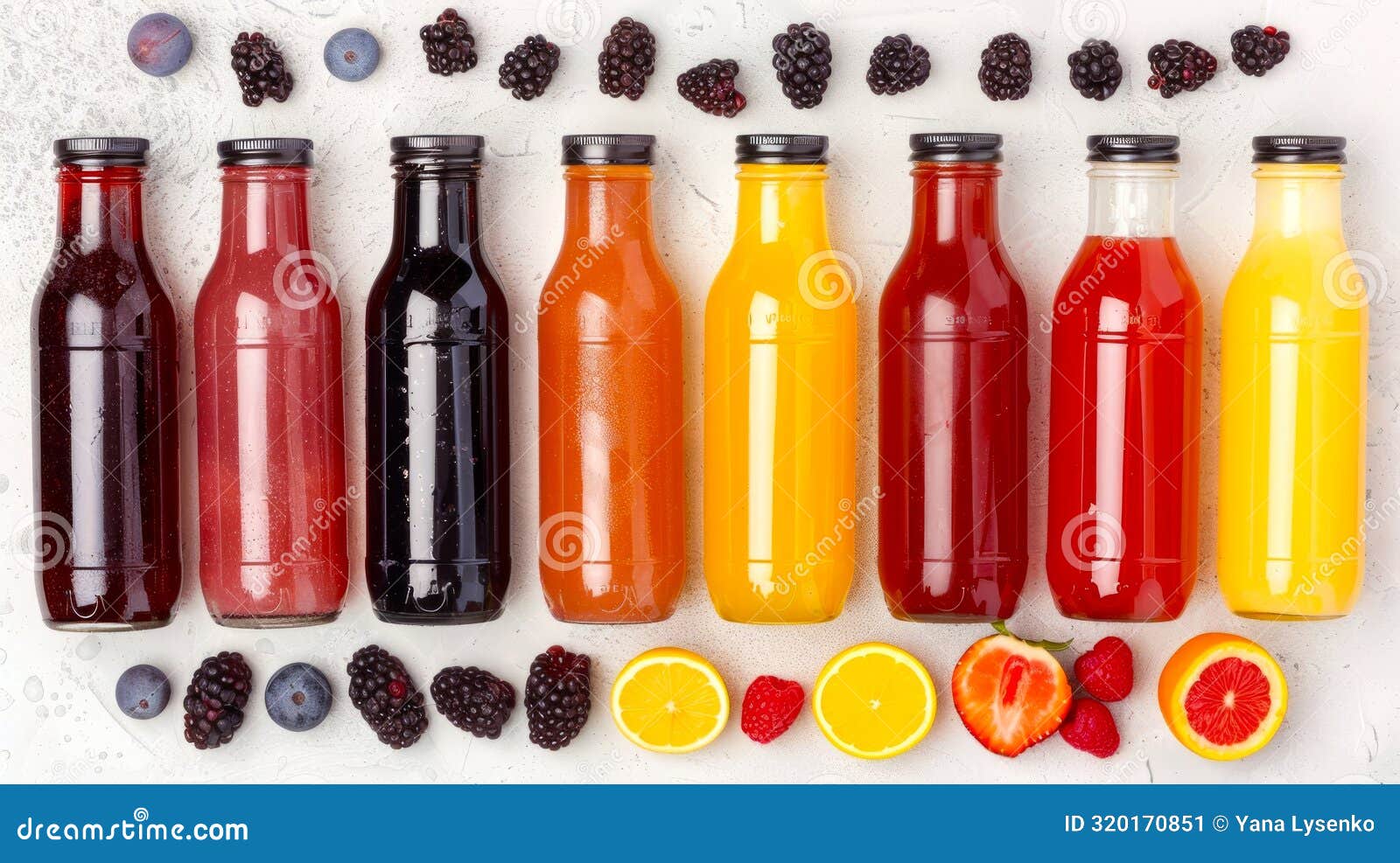 Assorted Glass Bottles of Different Colored Beverages in a Row. Drinks ...