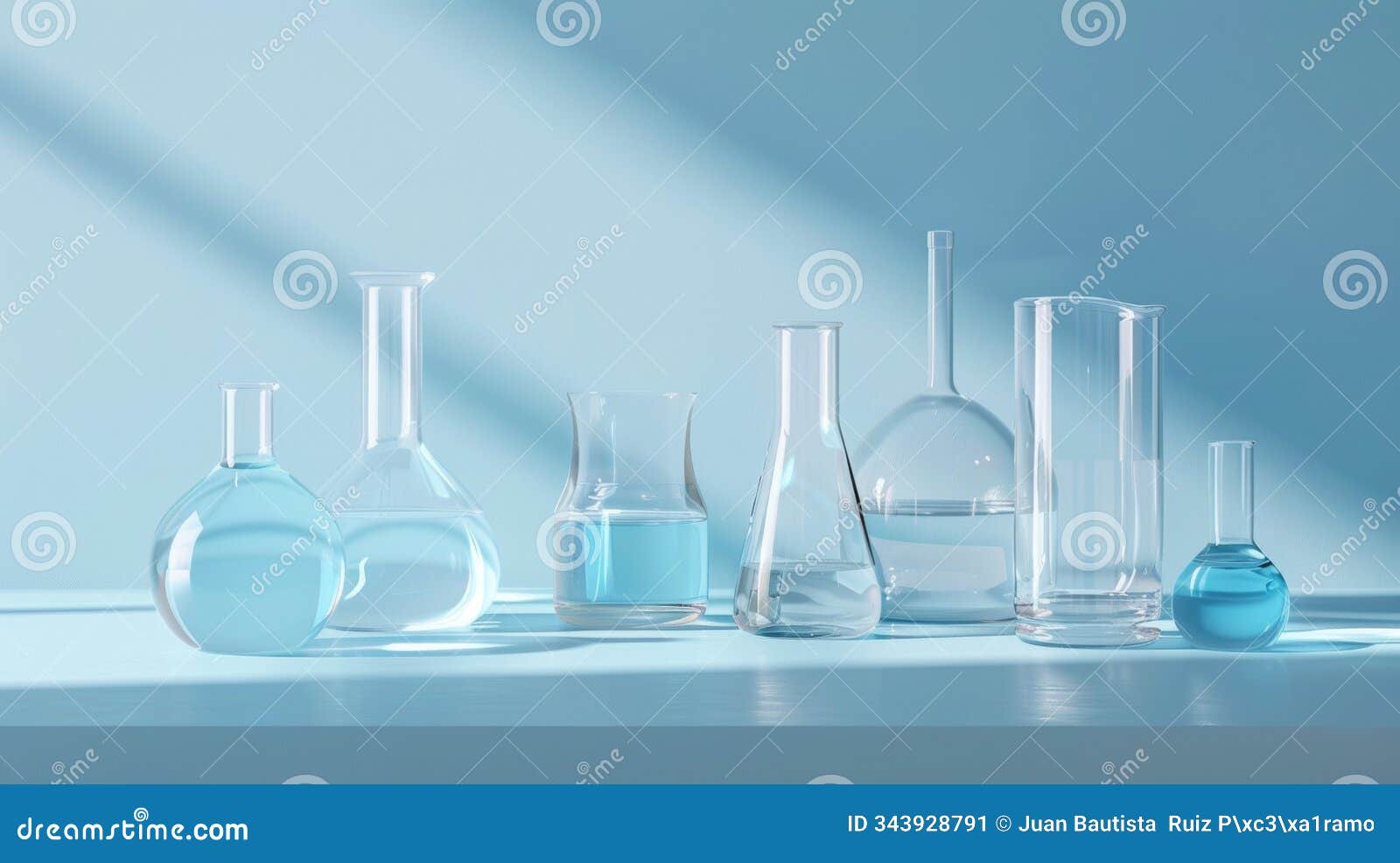 Assorted Glass Laboratory Flasks with Blue Liquid on Soft Blue ...