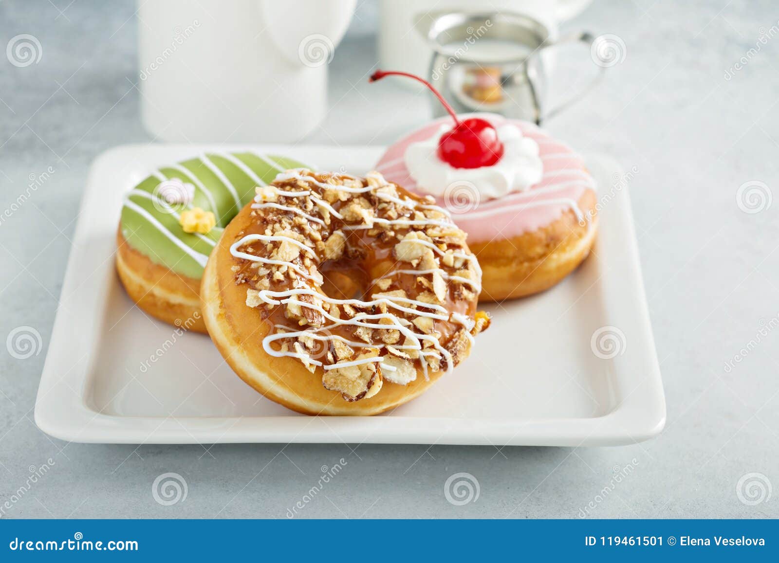 Assorted Glazed Fried Donuts on a Plate Stock Image - Image of colorful ...
