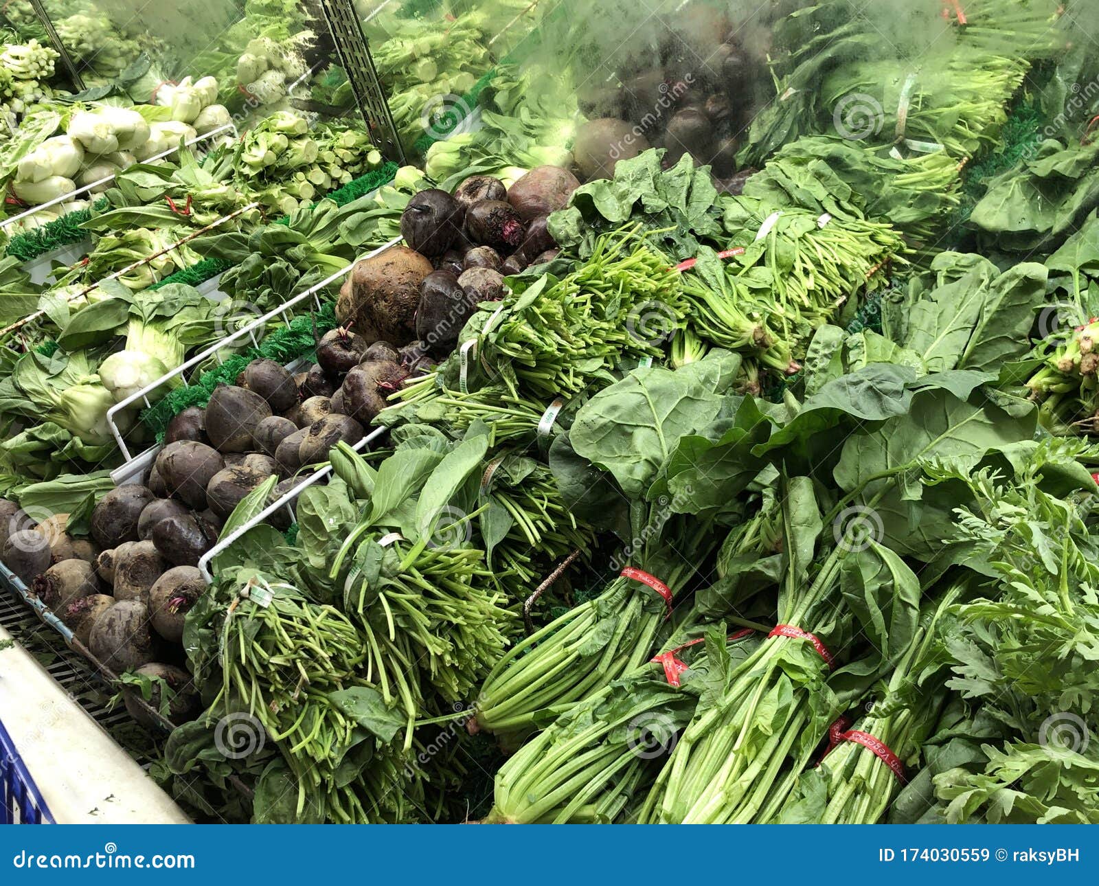 Green Leafy Vegetables and Root Crops at the Fresh Produce Section in a ...