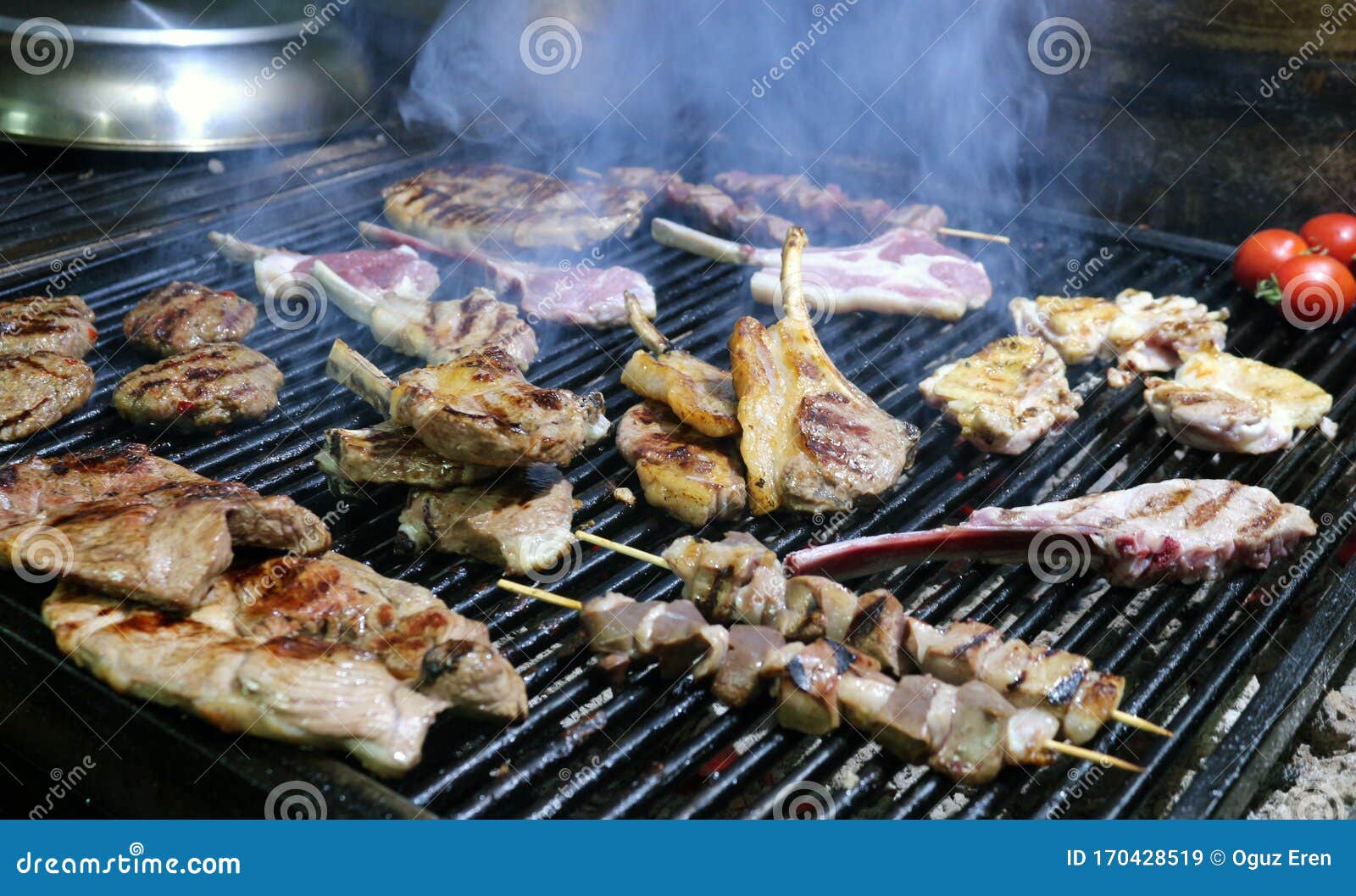Assorted Grilled Meat with Vegetables on a Barbecue Stock Image - Image ...