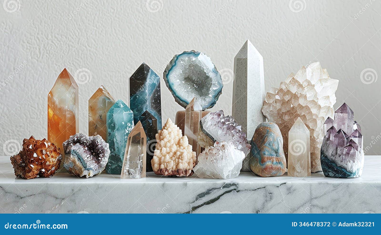 Assorted Healing Crystals and Gemstones on Marble Surface White ...