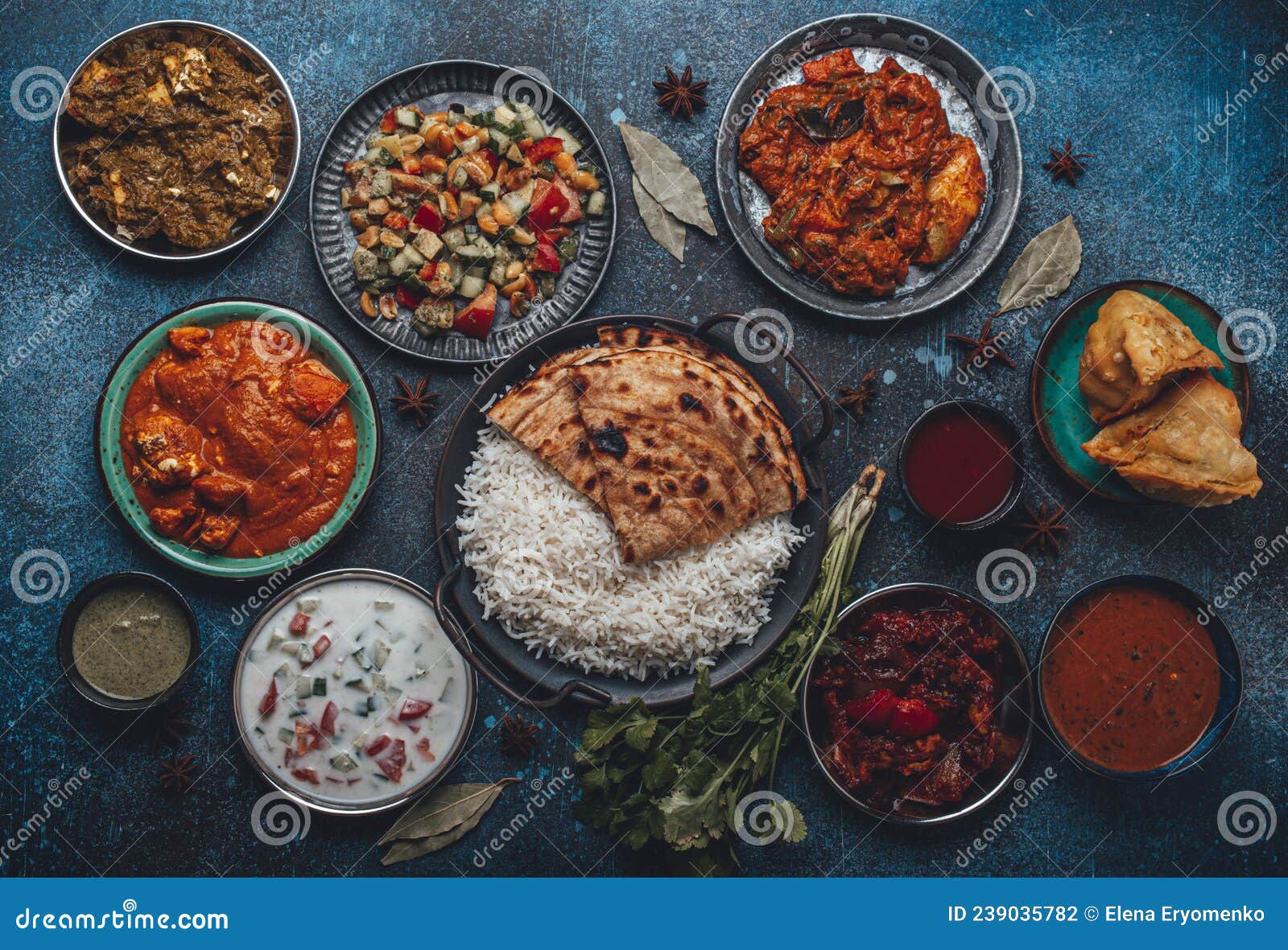 Assorted Indian Ethnic Food Buffet on Rustic Concrete Table from Above ...