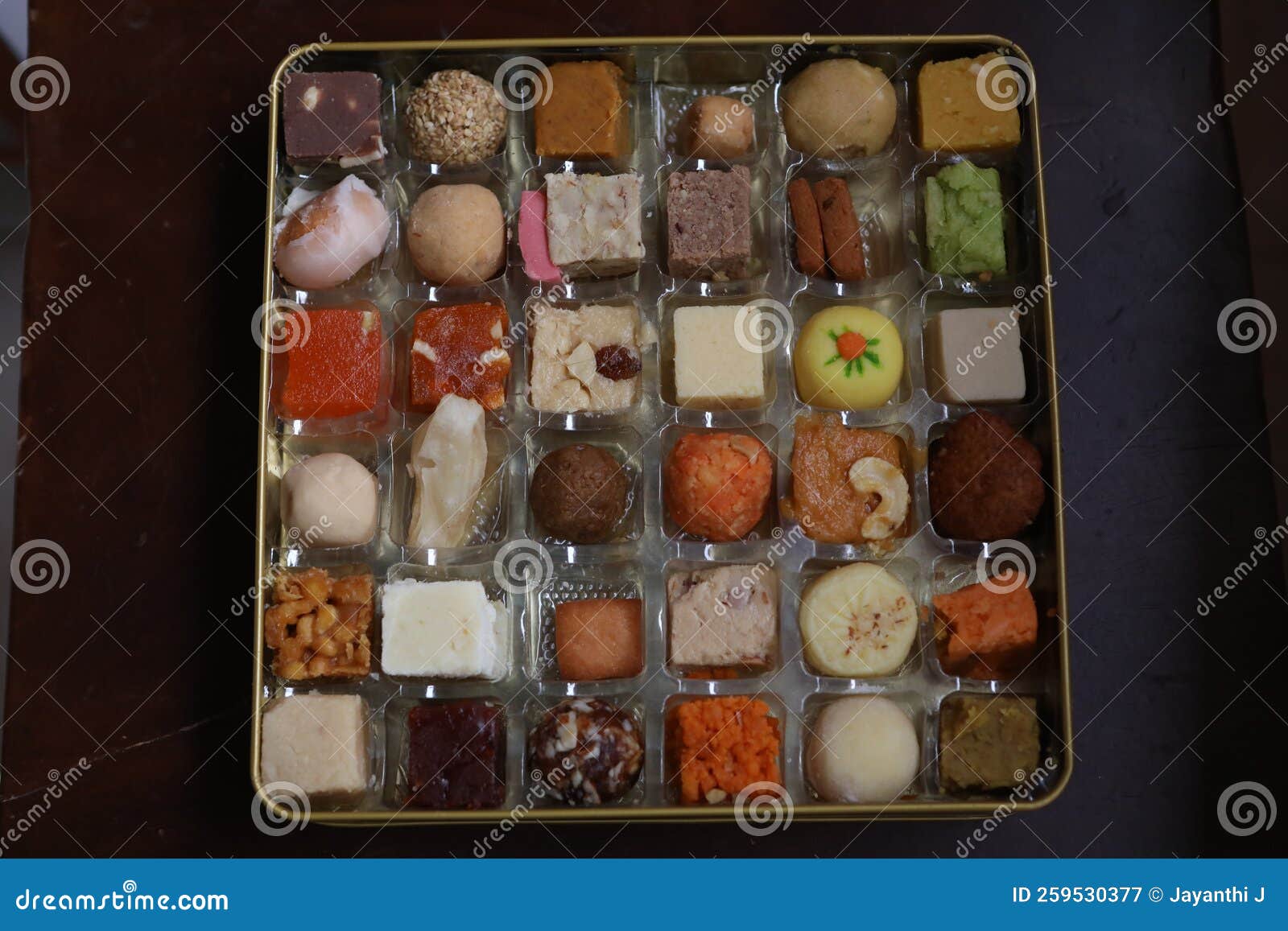Assorted Indian Milk Sweets Stock Image - Image of dark, arranged ...