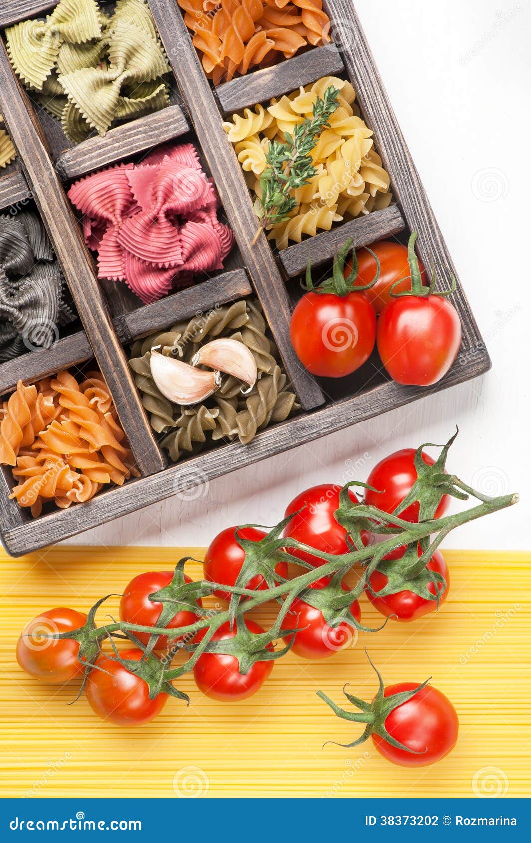 Assorted Italian Pasta and Spaghetti Tomatoes in Wooden Box Stock Photo ...