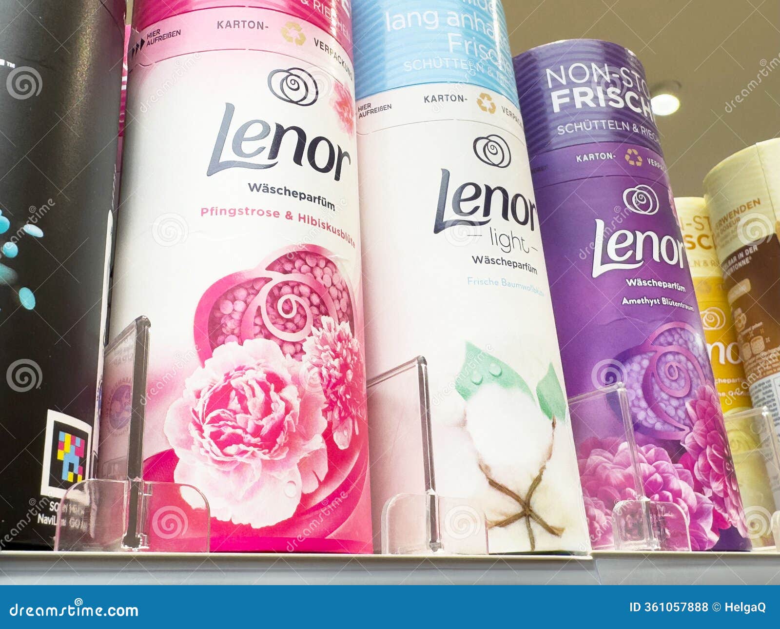 Assorted Lenor Fabric Softener Bottles in Vibrant Colors on Store Shelf ...