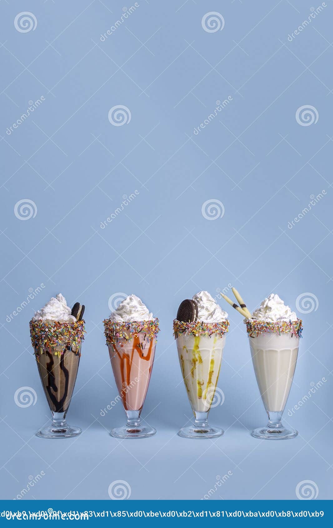 Assorted Milkshakes on a Blue Background. Photos for the Menu Stock ...