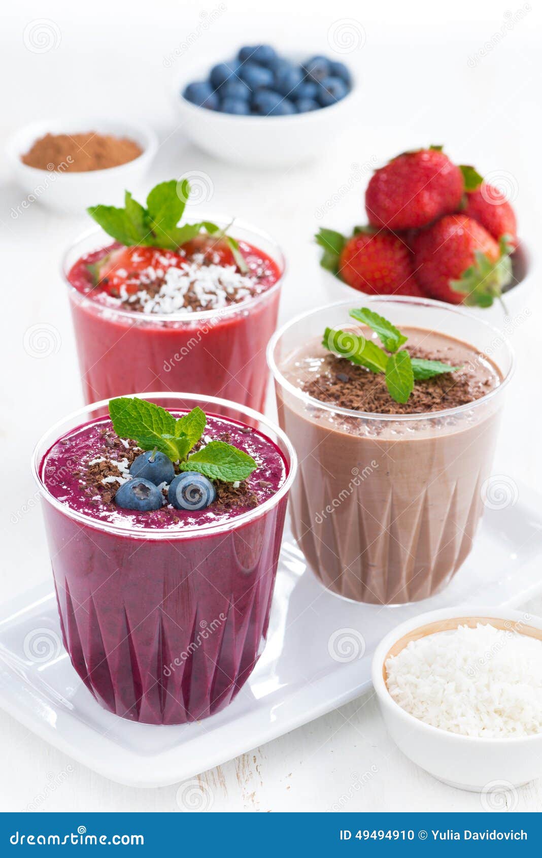 Assorted Milkshakes - Blueberry, Strawberry, Chocolate Stock Photo ...