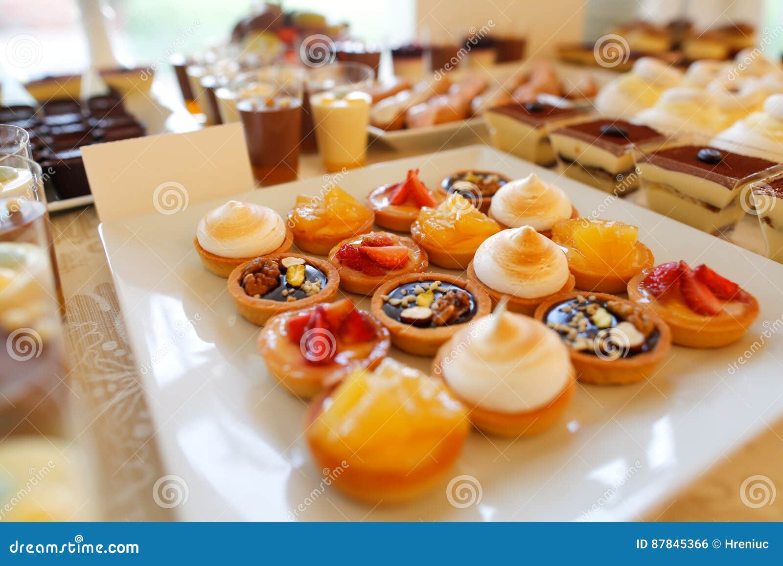 Assorted Mini Cakes on a Plate Stock Photo - Image of banquet, colorful ...