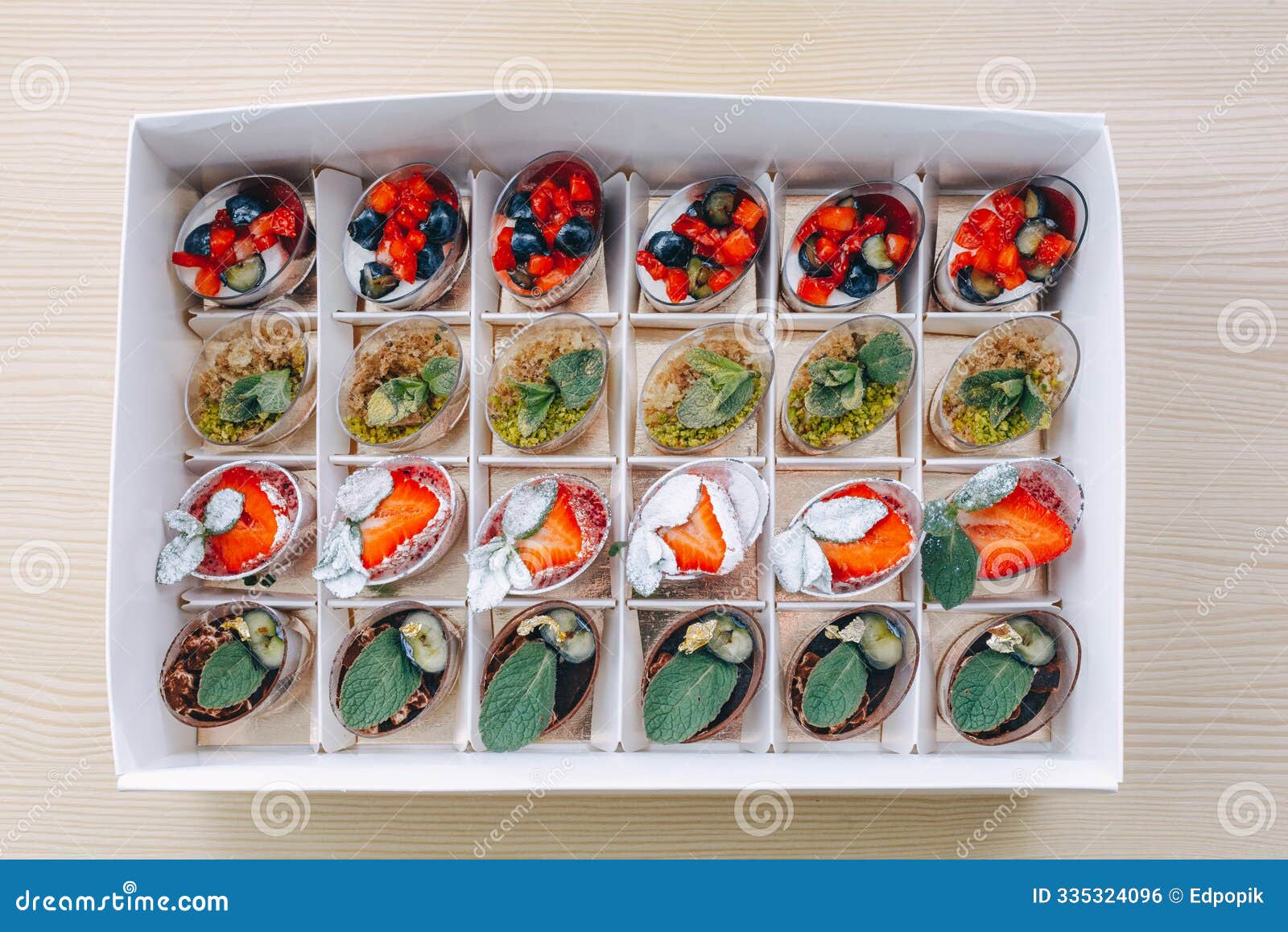 Assorted Mini Desserts in Box Display Stock Photo - Image of ...