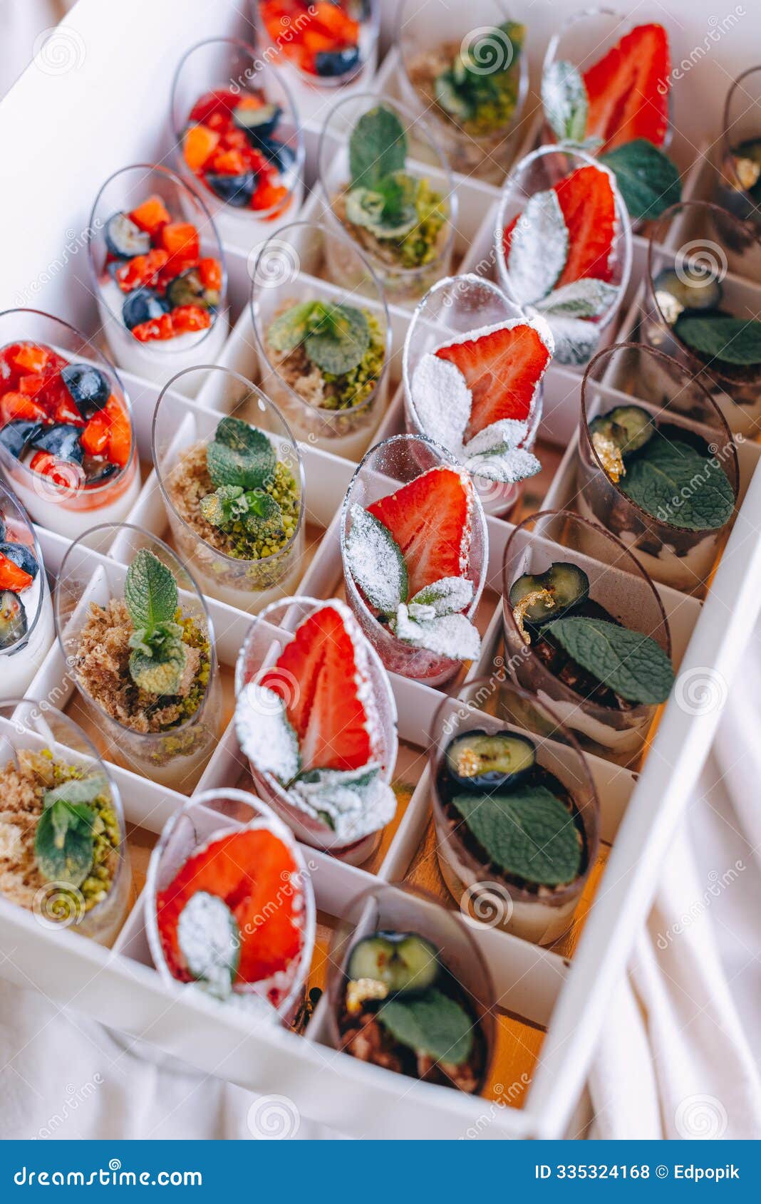 Assorted Mini Desserts in Box Display Stock Photo - Image of decoration ...