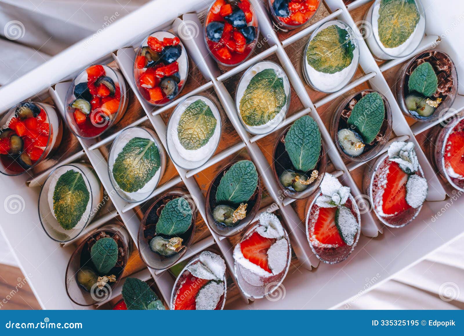 Assorted Mini Desserts in Box Display Stock Image - Image of catering ...