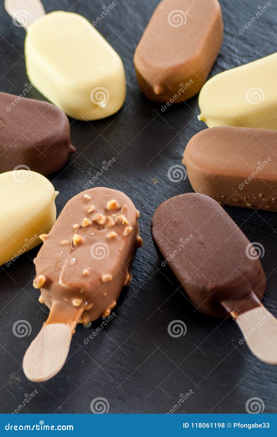 Assorted Mini Ice Creams on Stick on Black Stock Photo - Image of ...