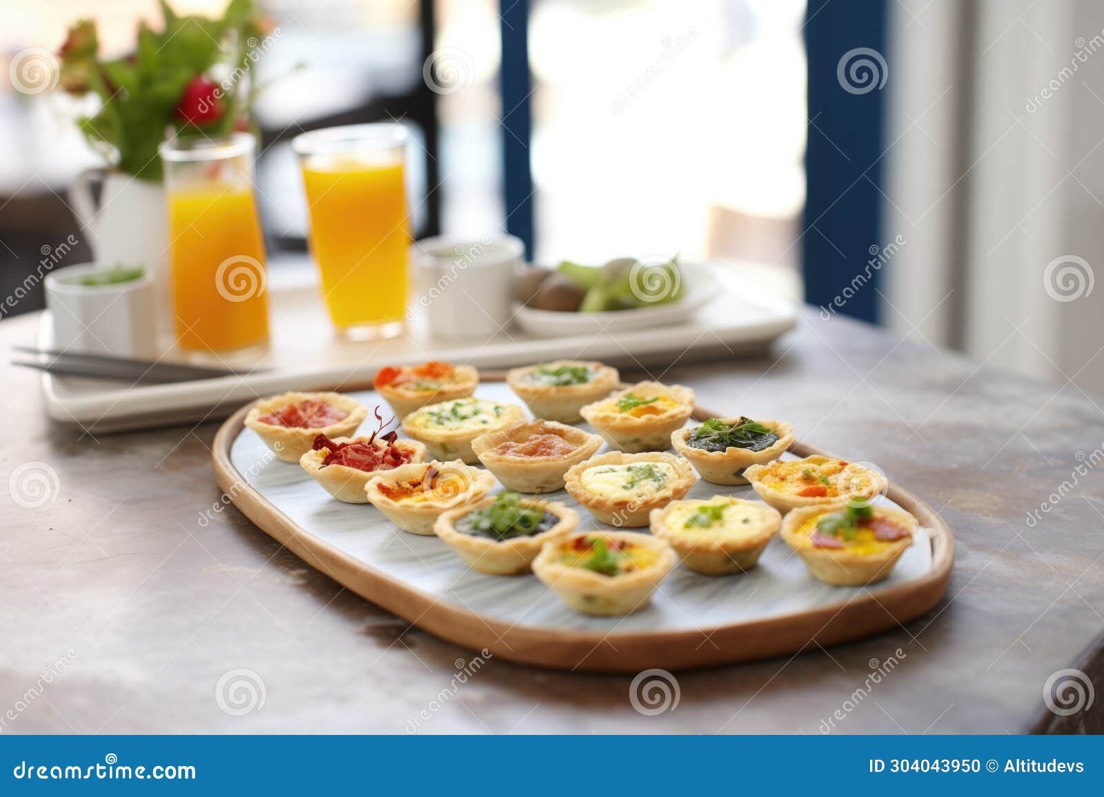 Assorted Mini Quiches on a Ceramic Tray Stock Photo - Image of mini ...