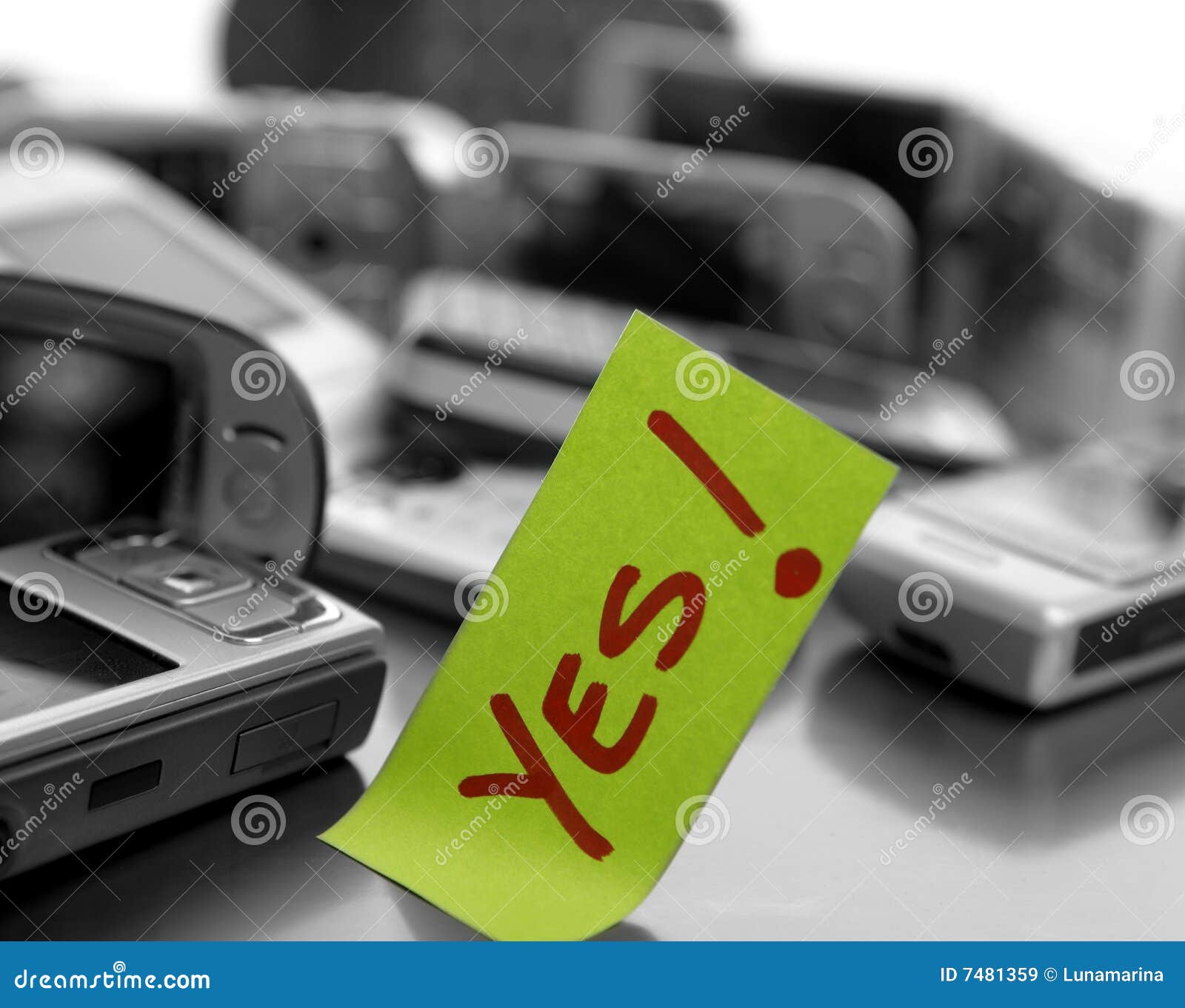 Assorted Mobile Phones and Written Word: YES Stock Image - Image of ...