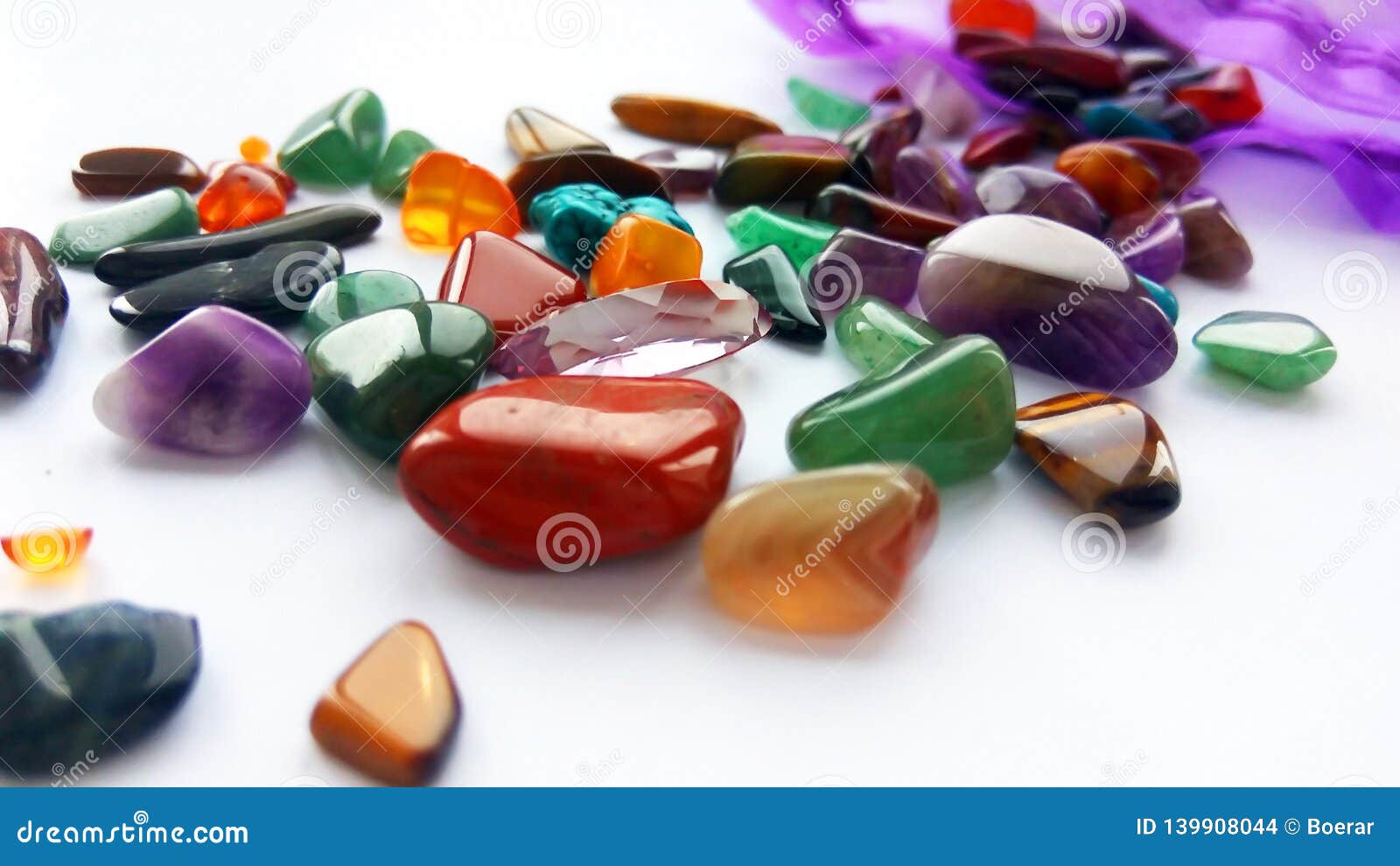 Natural Bright Coloured Semi Precious Gemstones and Gems with a Bag on ...