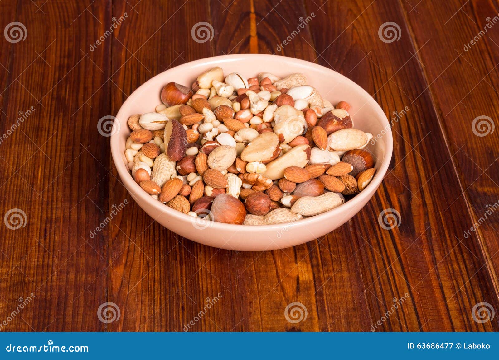 Assorted nuts in bowl stock image. Image of brown, nutritious - 63686477