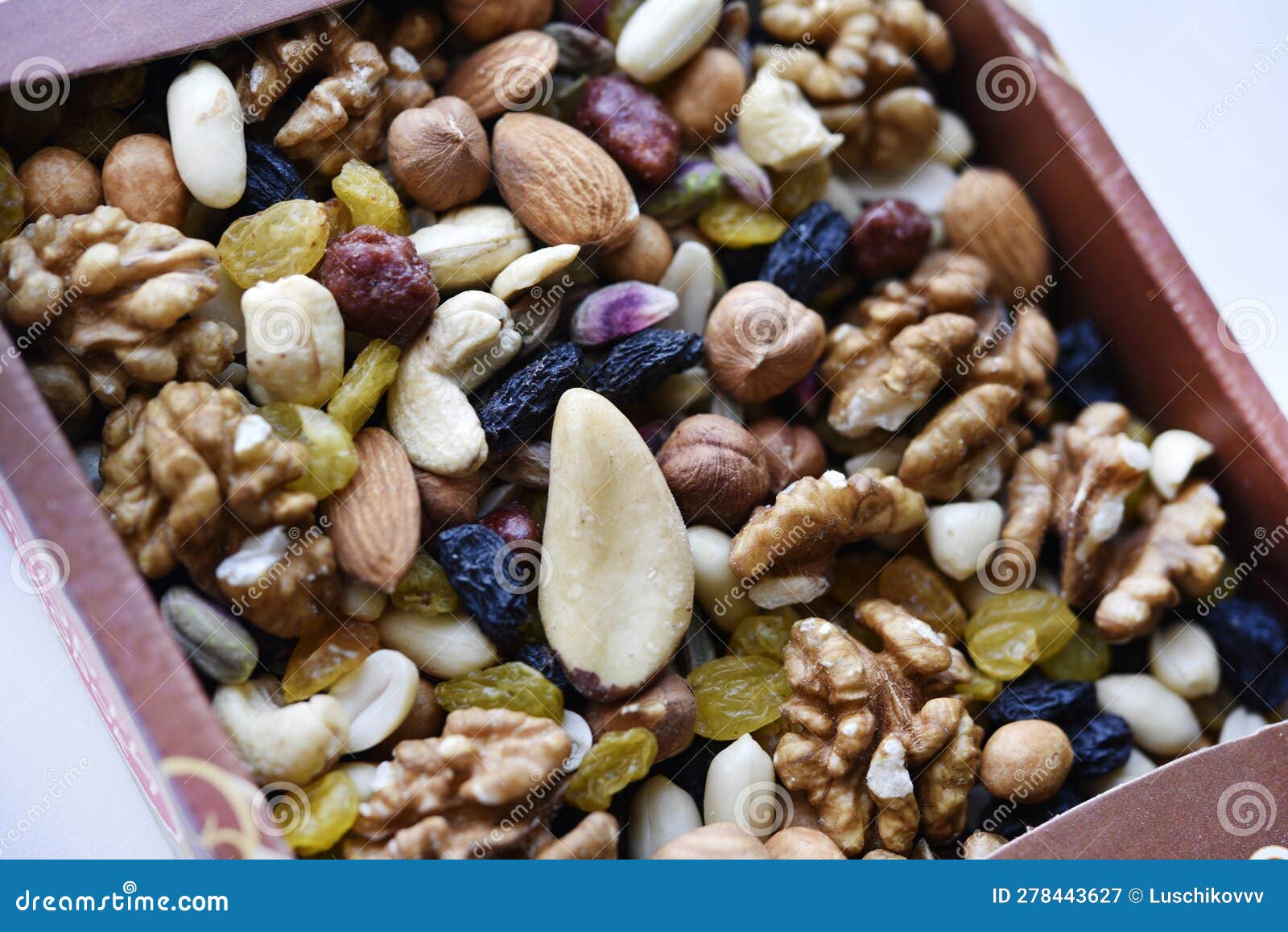 Assorted Nuts in a Box Close-up. Delicious Different Nuts in a Box ...