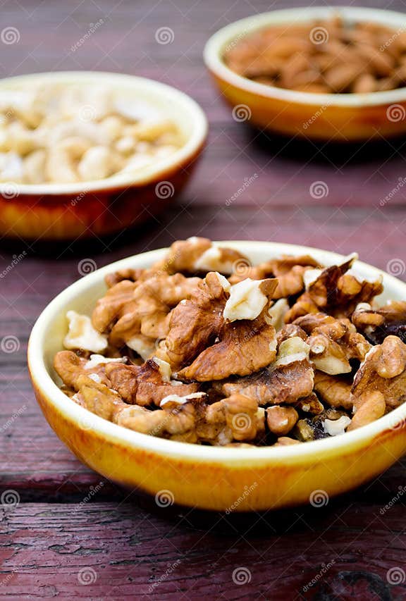 Assorted Nuts in Dishes on Wooden Table Stock Image - Image of nature ...
