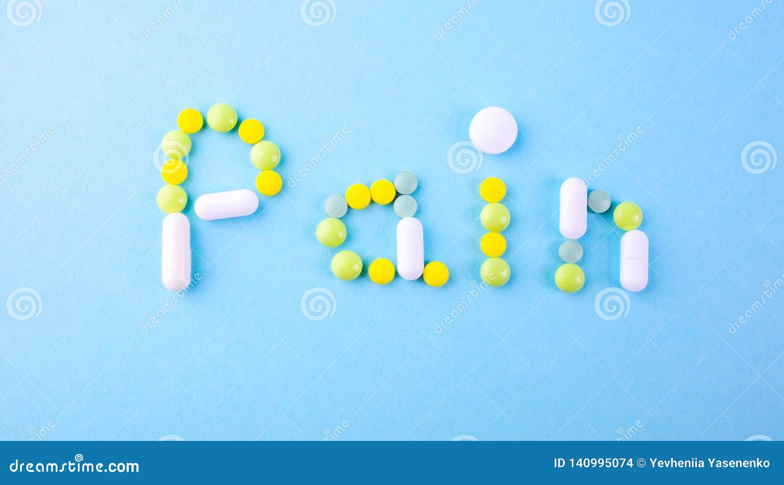 The Word Pain is Lined with Multi-colored Pills on a Blue Background ...