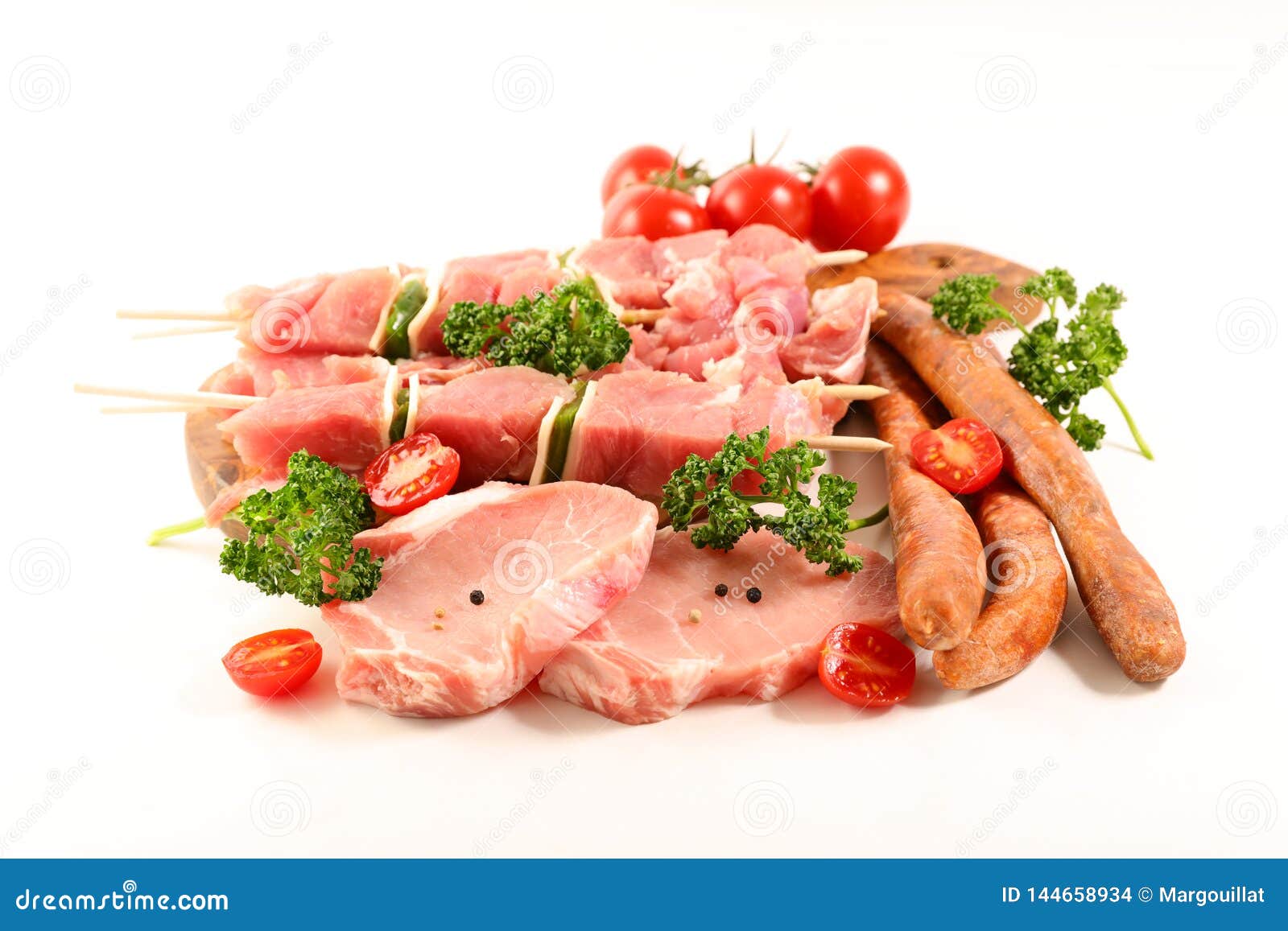 Assorted raw meats stock photo. Image of barbecue, tomato - 144658934