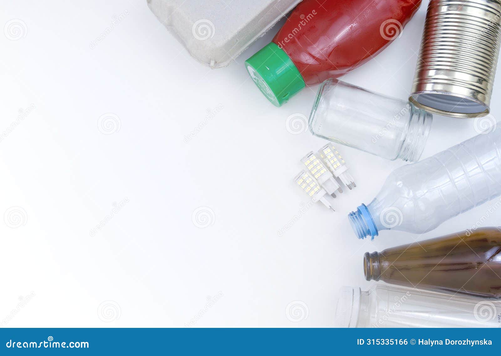 Assorted Recyclable Materials Arranged on White Background Stock Photo ...