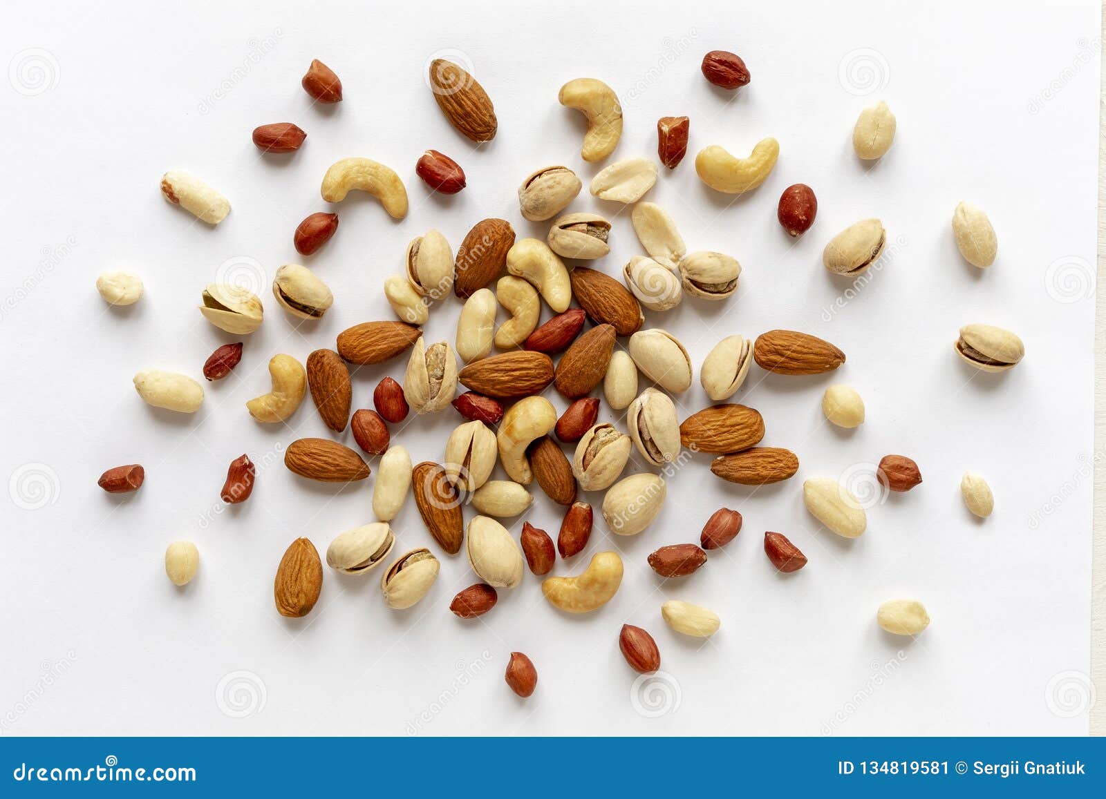 Assorted Roasted and Raw Nuts Scattered on White Stock Image - Image of ...