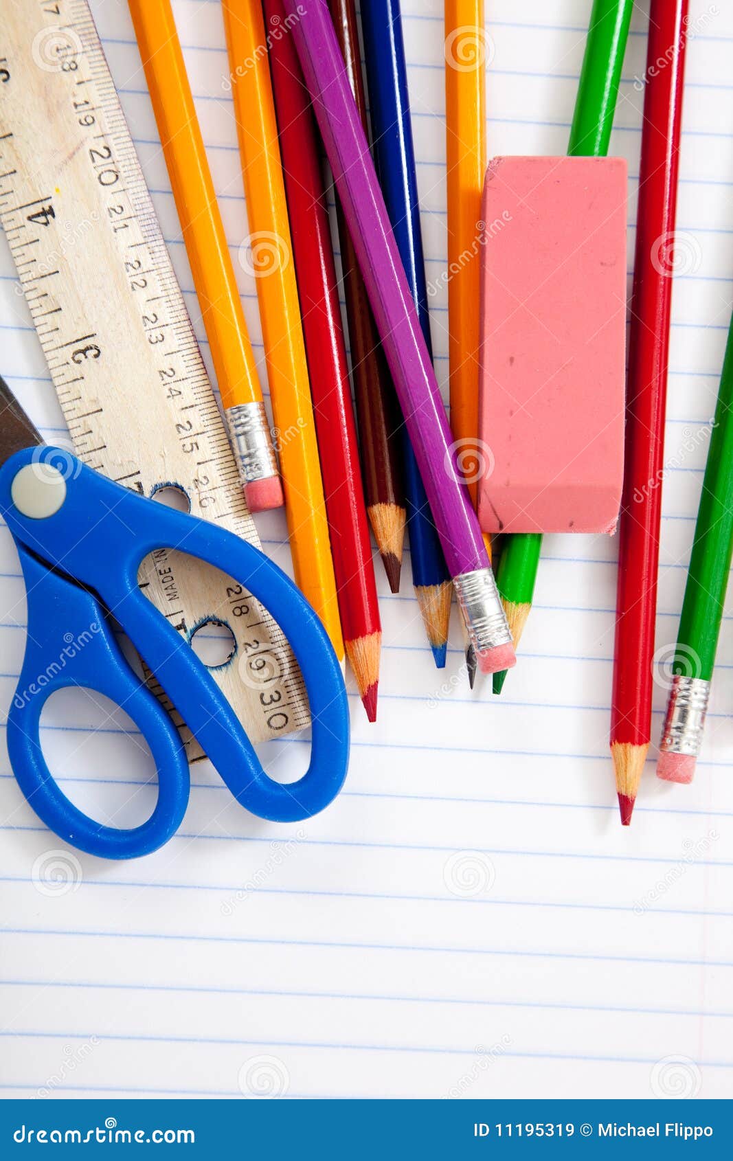 Assorted School Supplies on a Lined Notebook Stock Image - Image of ...
