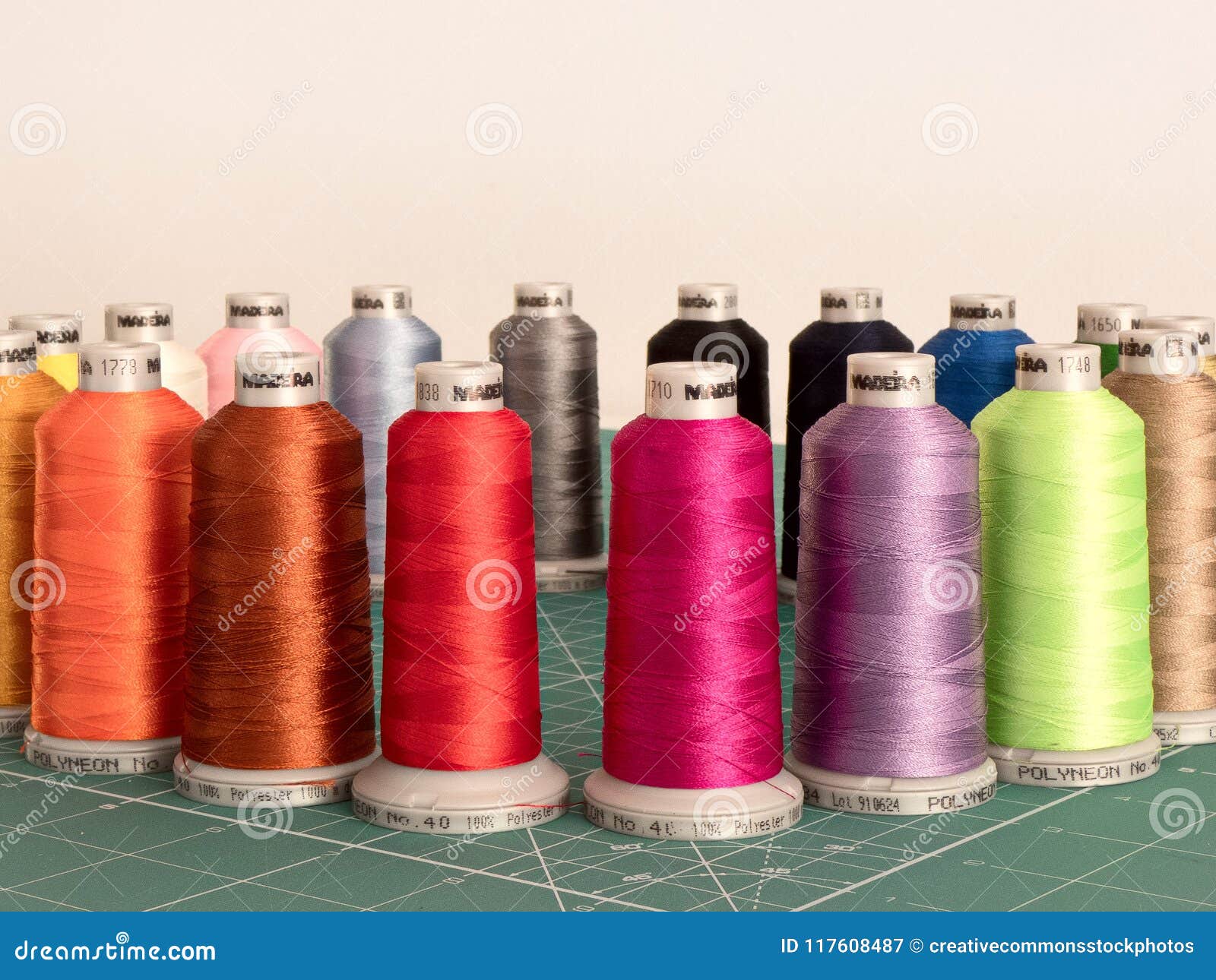 Assorted Sewing Threads On Greensurface Picture. Image: 117608487