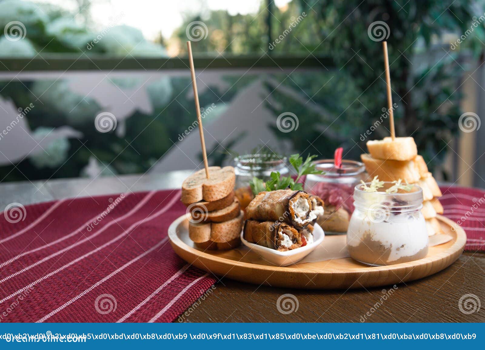 Assorted Snacks in Jars on a Wooden Stand on the Table Stock Photo ...
