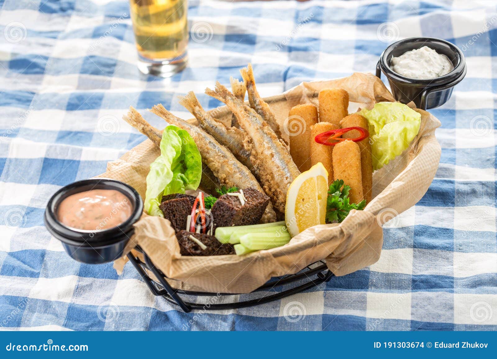 Assorted Snacks Like Deep Fried Fish, Mozzarella Sticks, Rye Bread ...