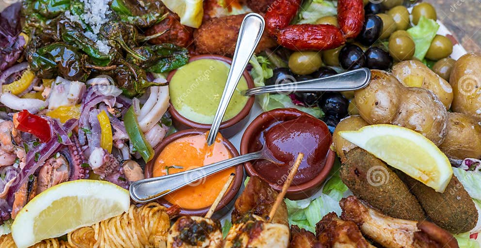 Assorted Spanish tapas stock photo. Image of meat, meet - 282341942