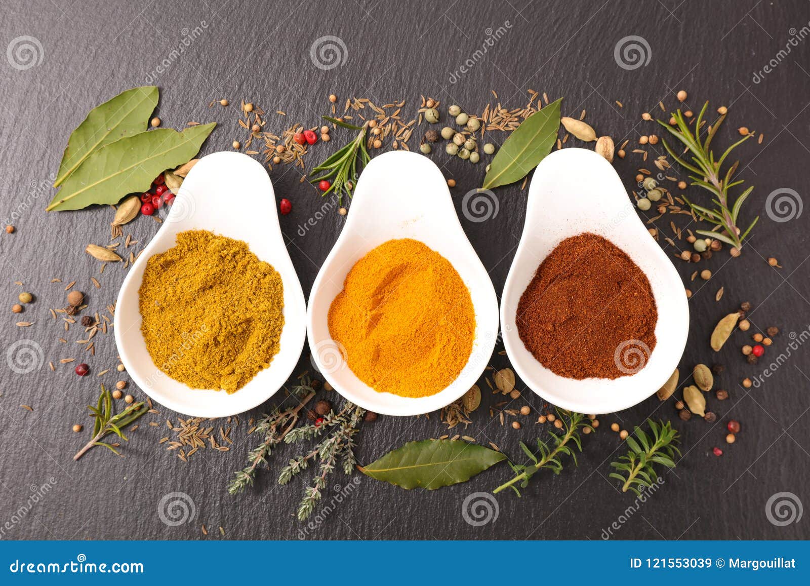 Assorted spices and herbs stock image. Image of basil - 121553039