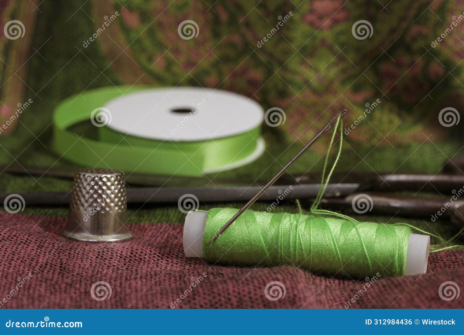 Several Different Types of Spools and Sewing Tools on the Table Stock ...