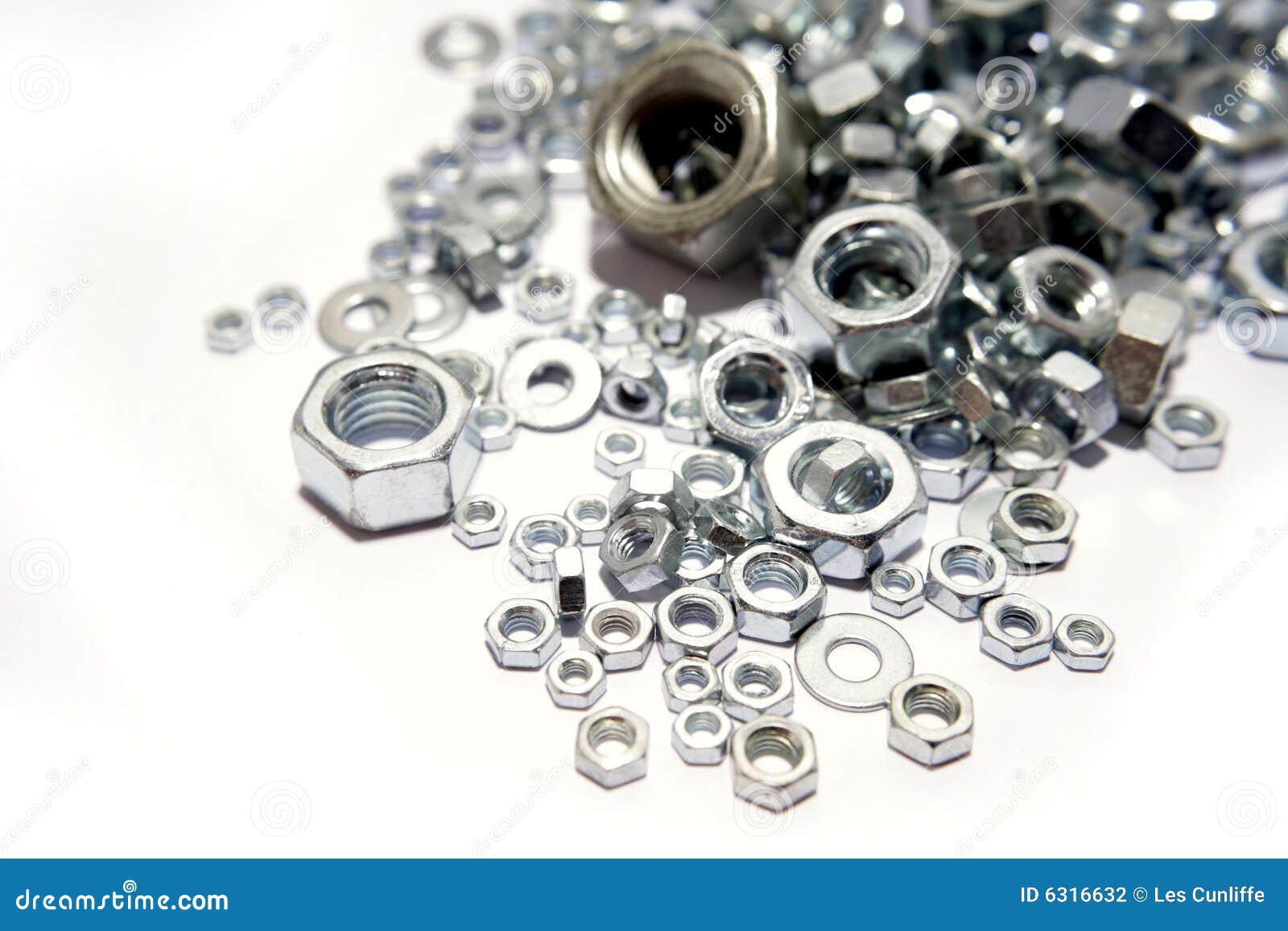 Assorted steel nuts stock photo. Image of threads, supplies - 6316632