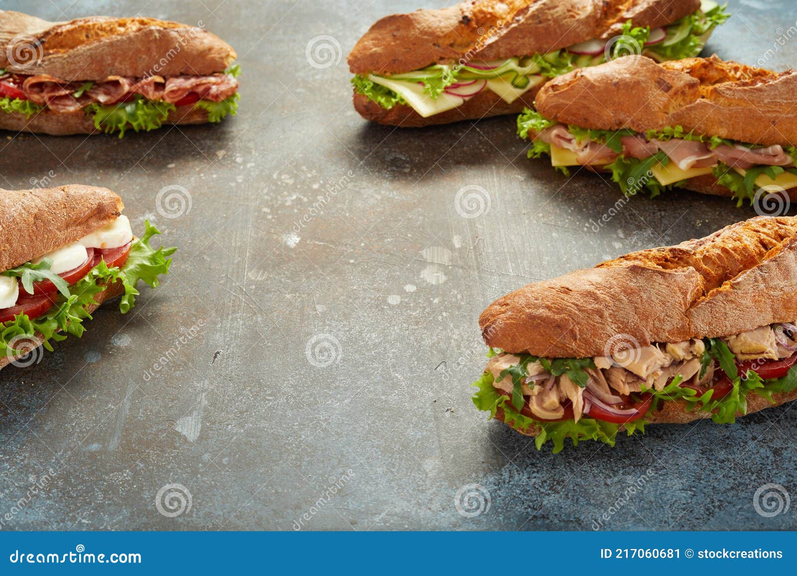 Assorted Sub Sandwiches on Weathered Table Stock Image - Image of ...